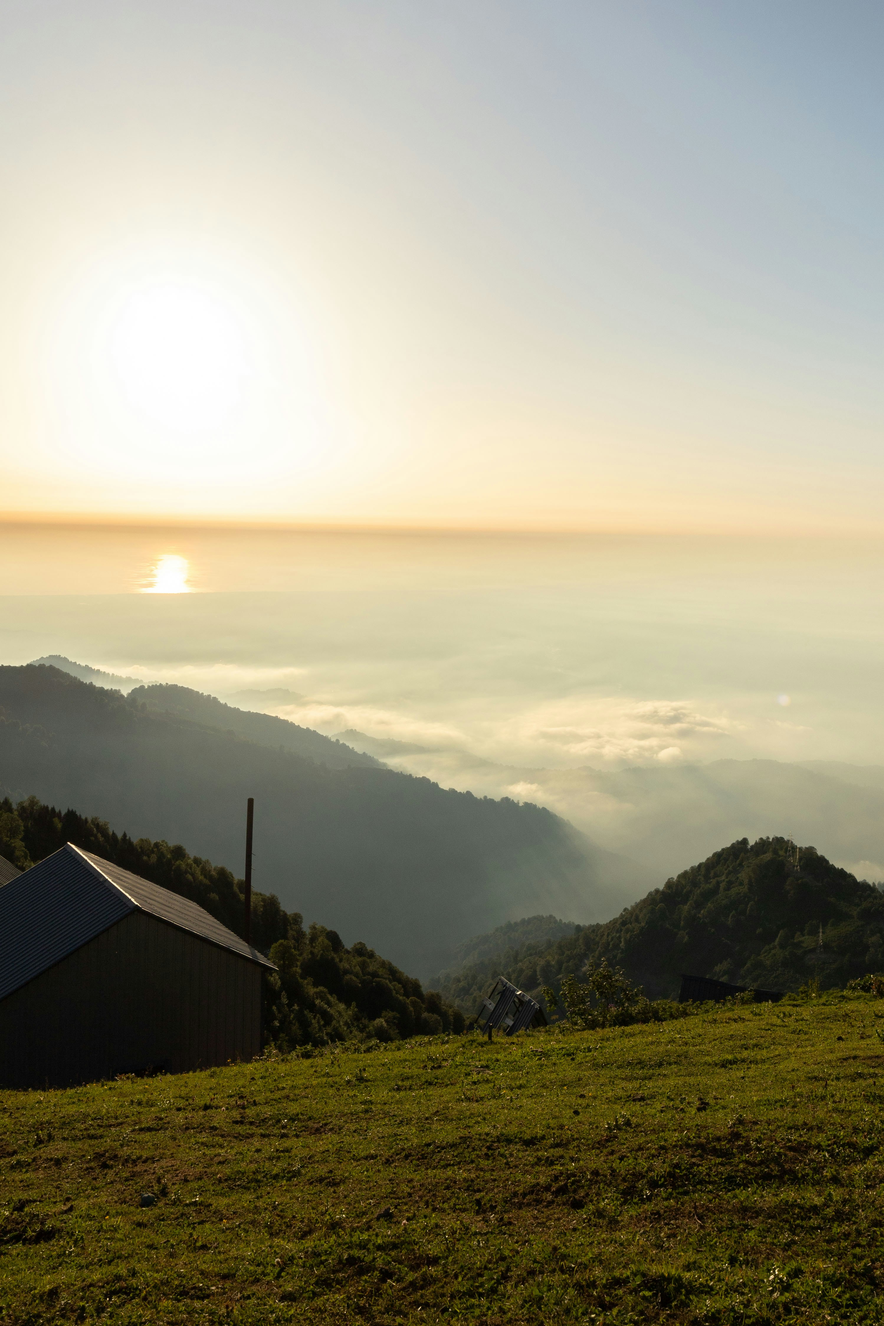 Sunlit Terrace Over Fog: A Quiet Mountain Morning
