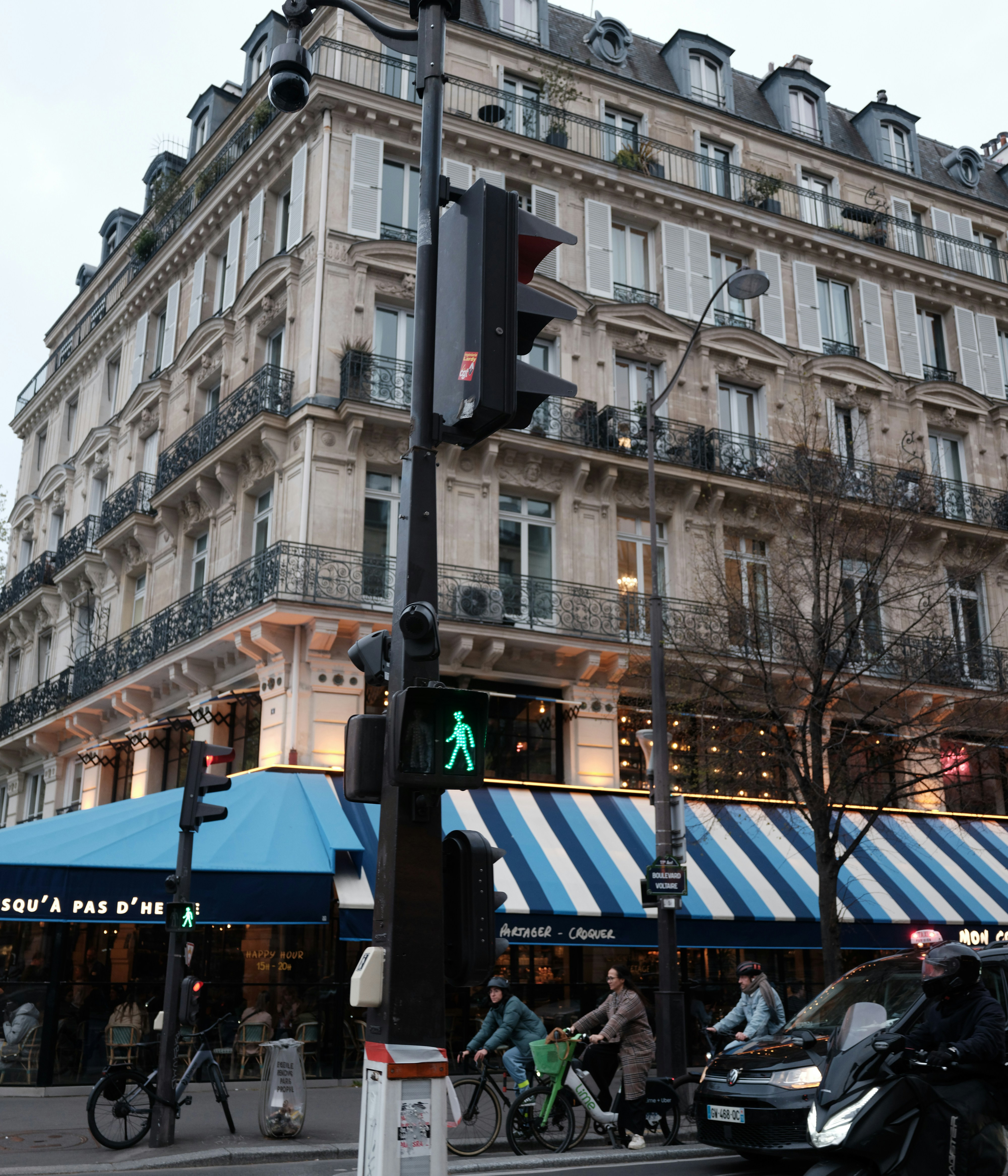 Corner Café Façade on a Parisian Avenue
