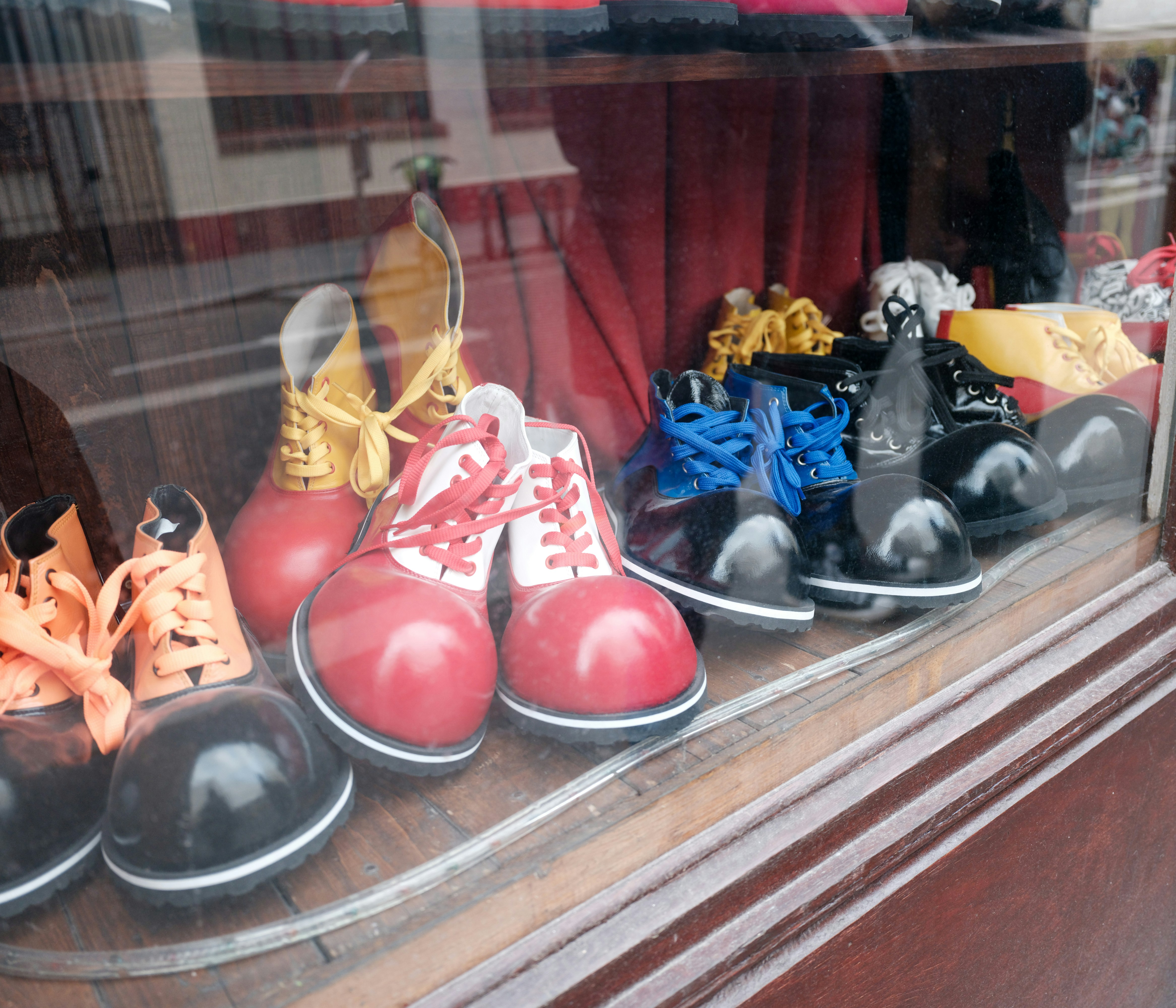 Row of Colorful Shoes in a Shop Window
