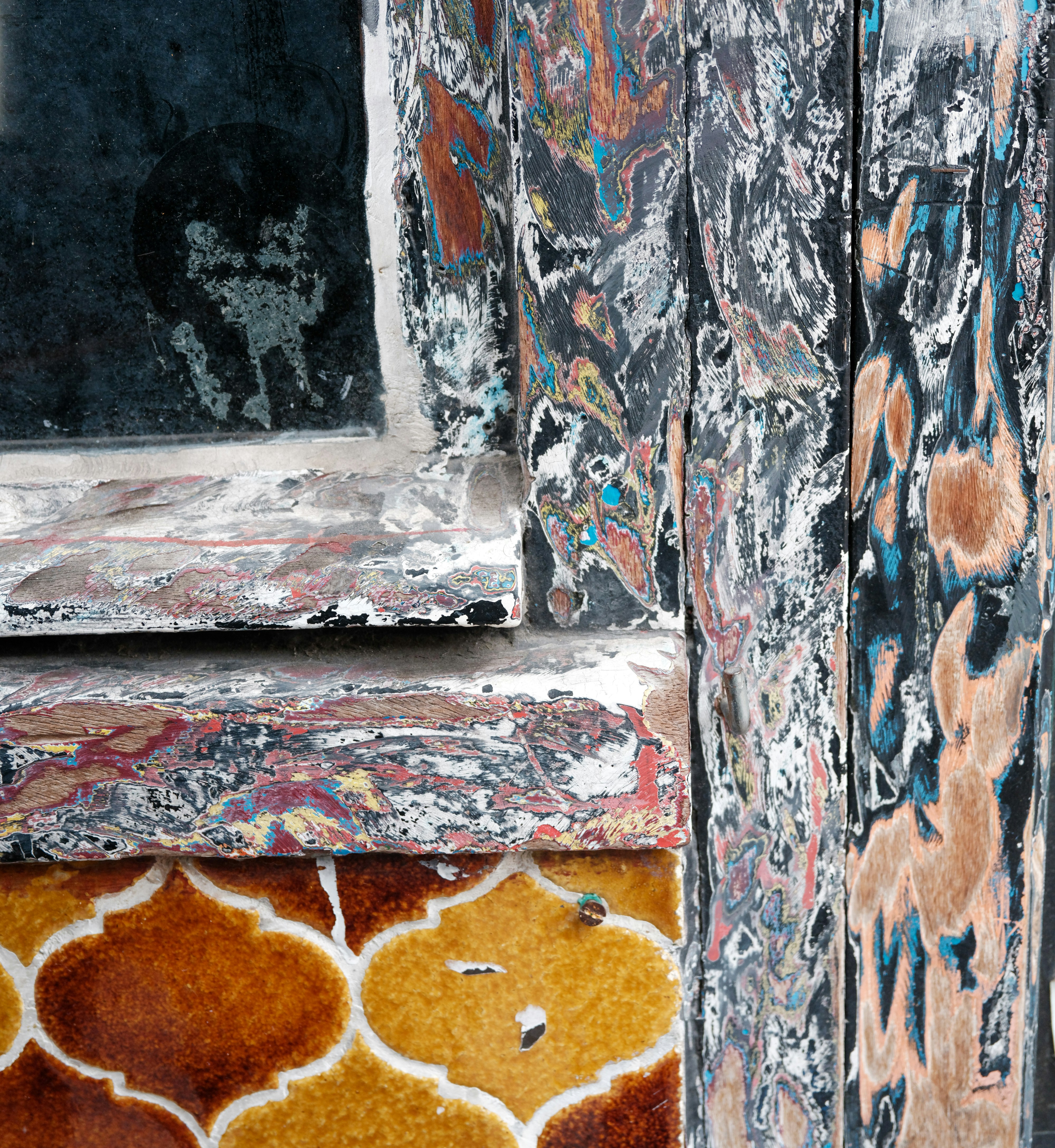 Urban Echoes: Weathered Tiles and Painted Glass