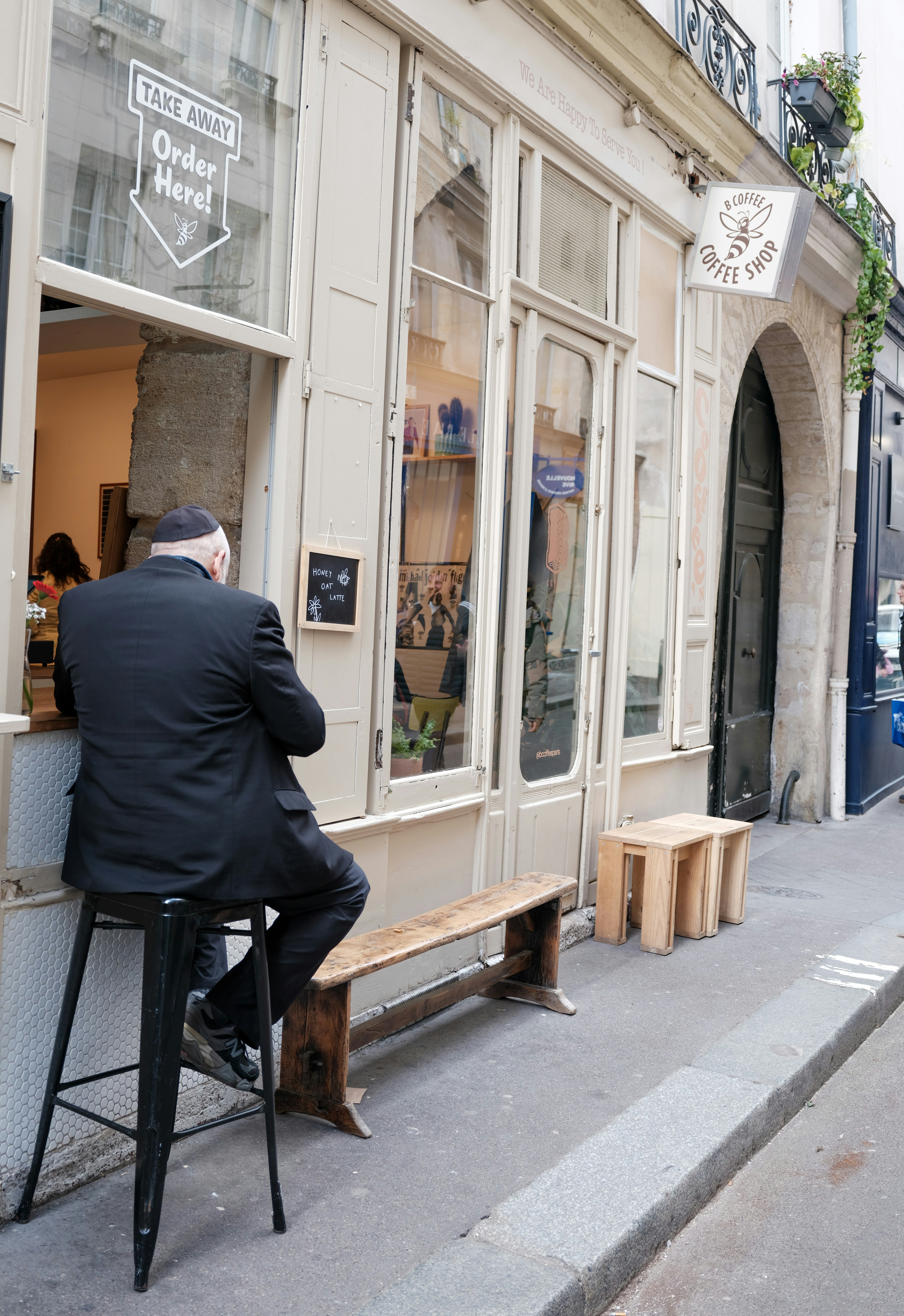 Evening Brew: A Moment on the Quiet Café Façade