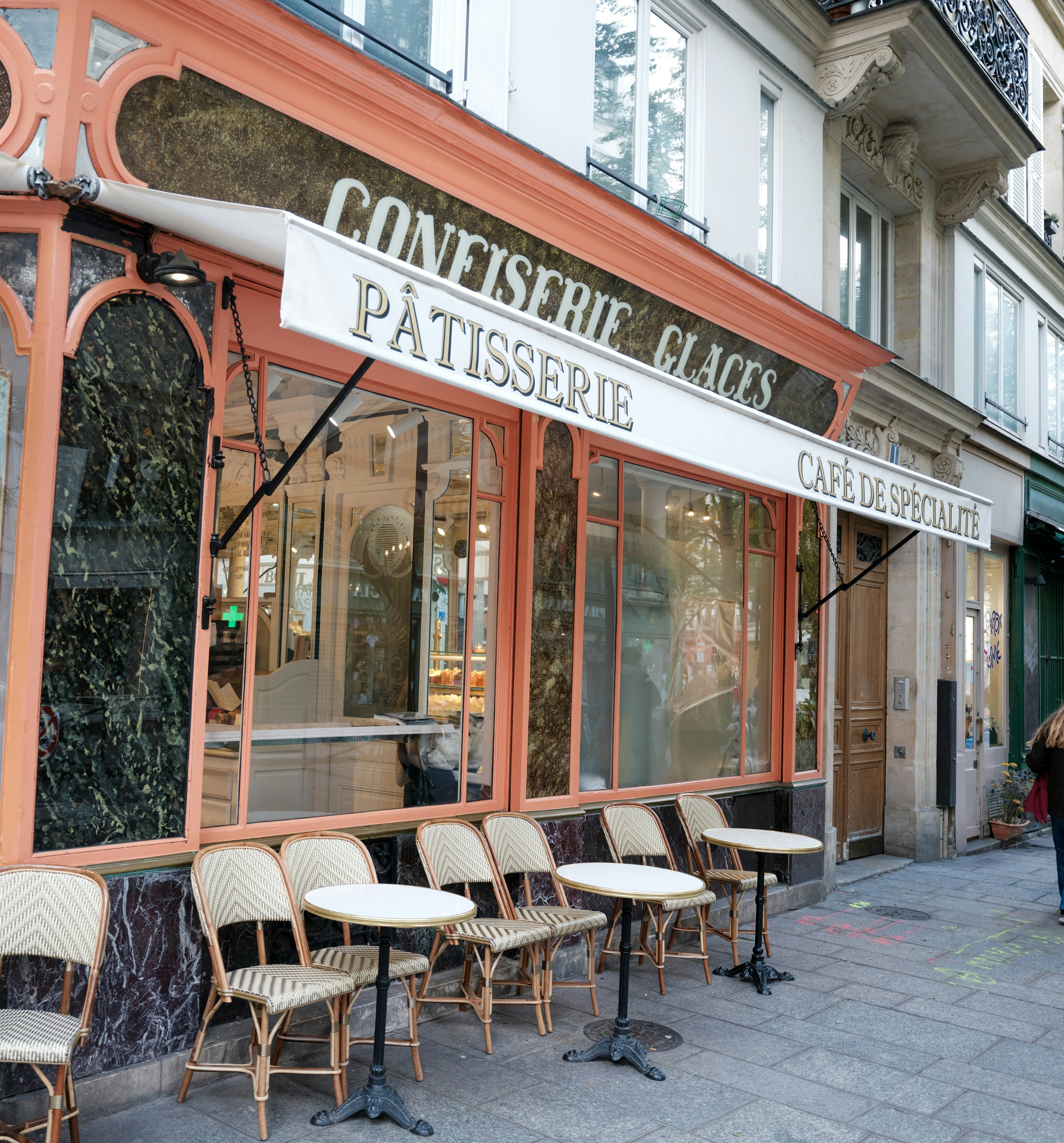 Pastel Café Terrace on a Parisian Street