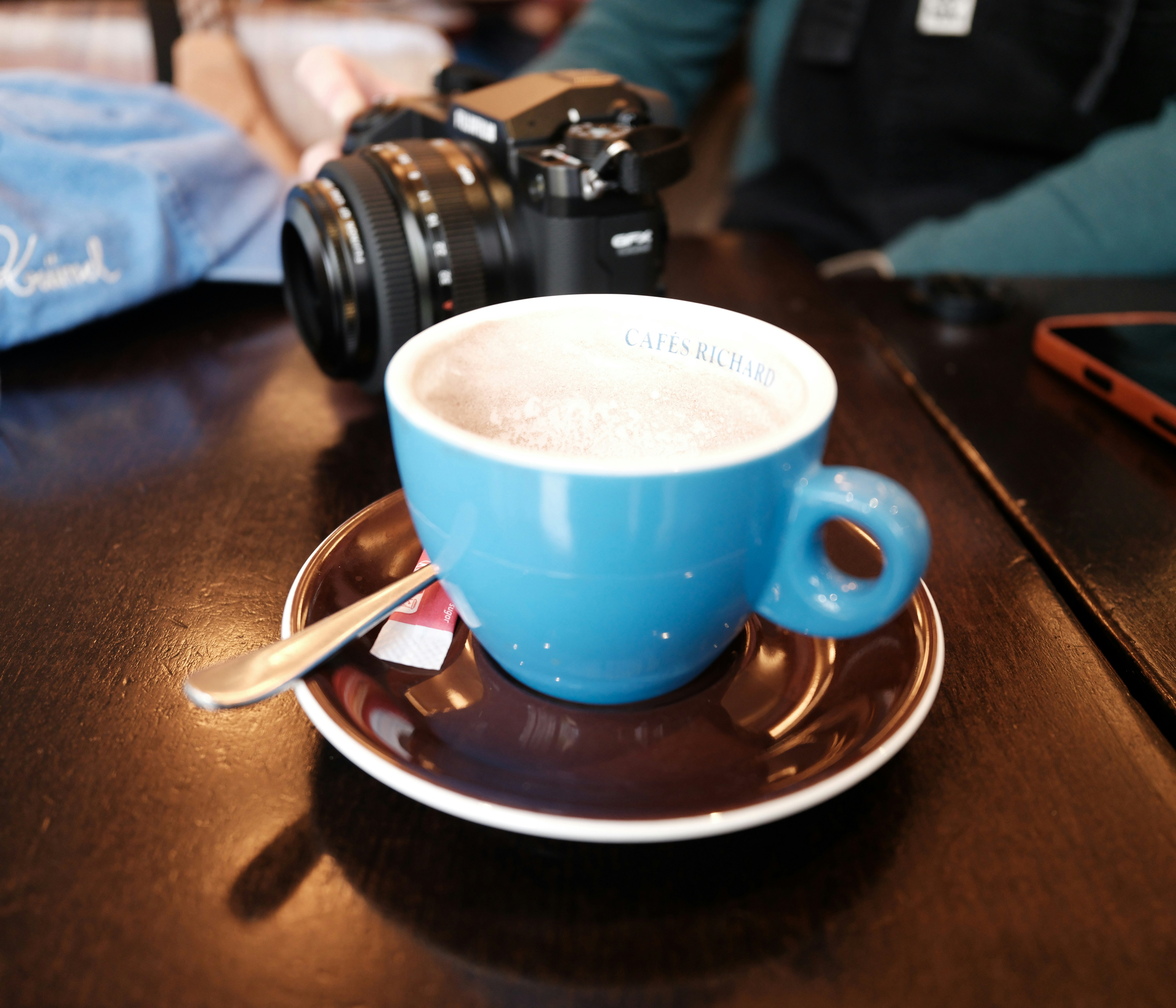 Blue Cup of Comfort Under the Wakeful Glass