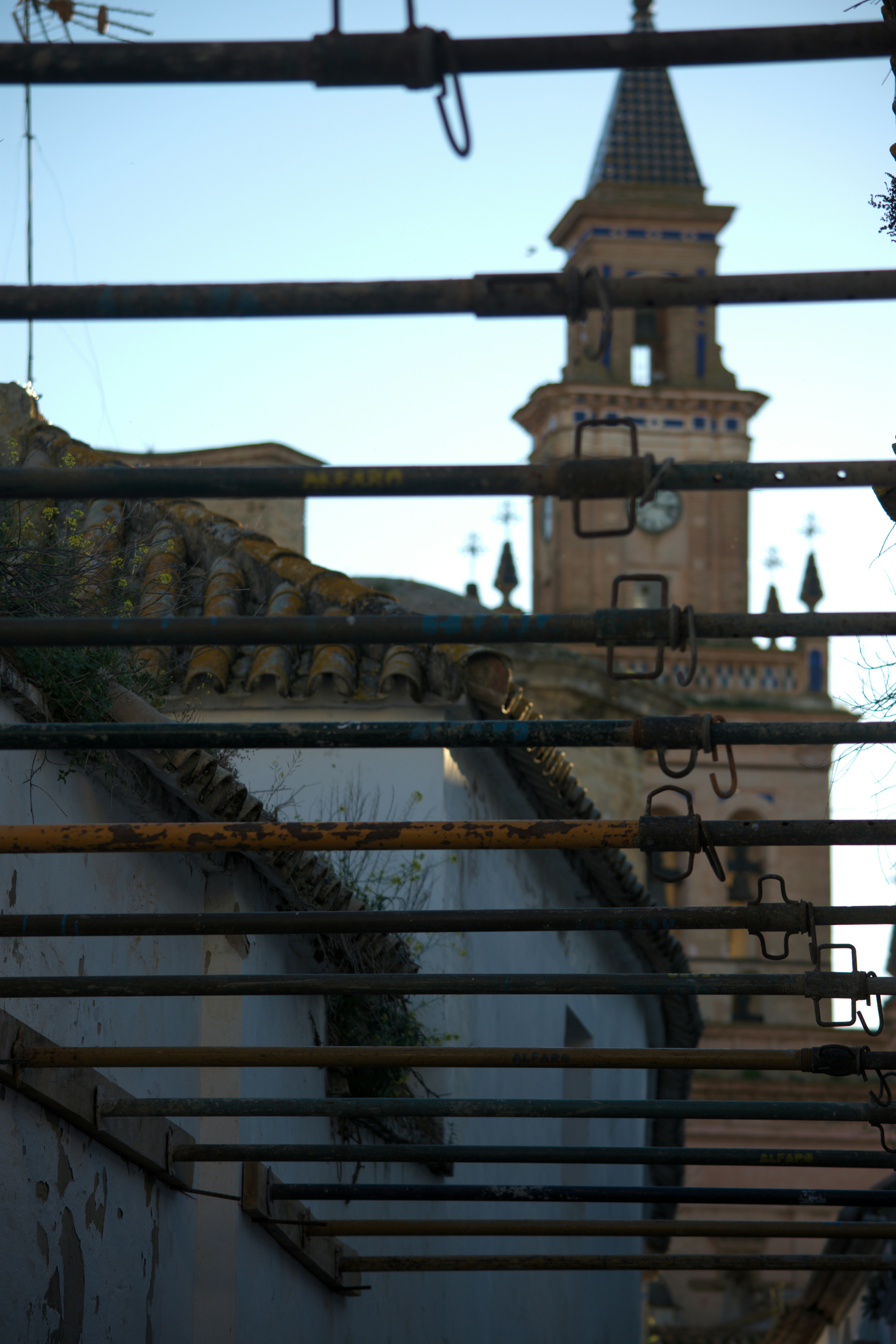 Rising Tower Behind Industrial Lattice