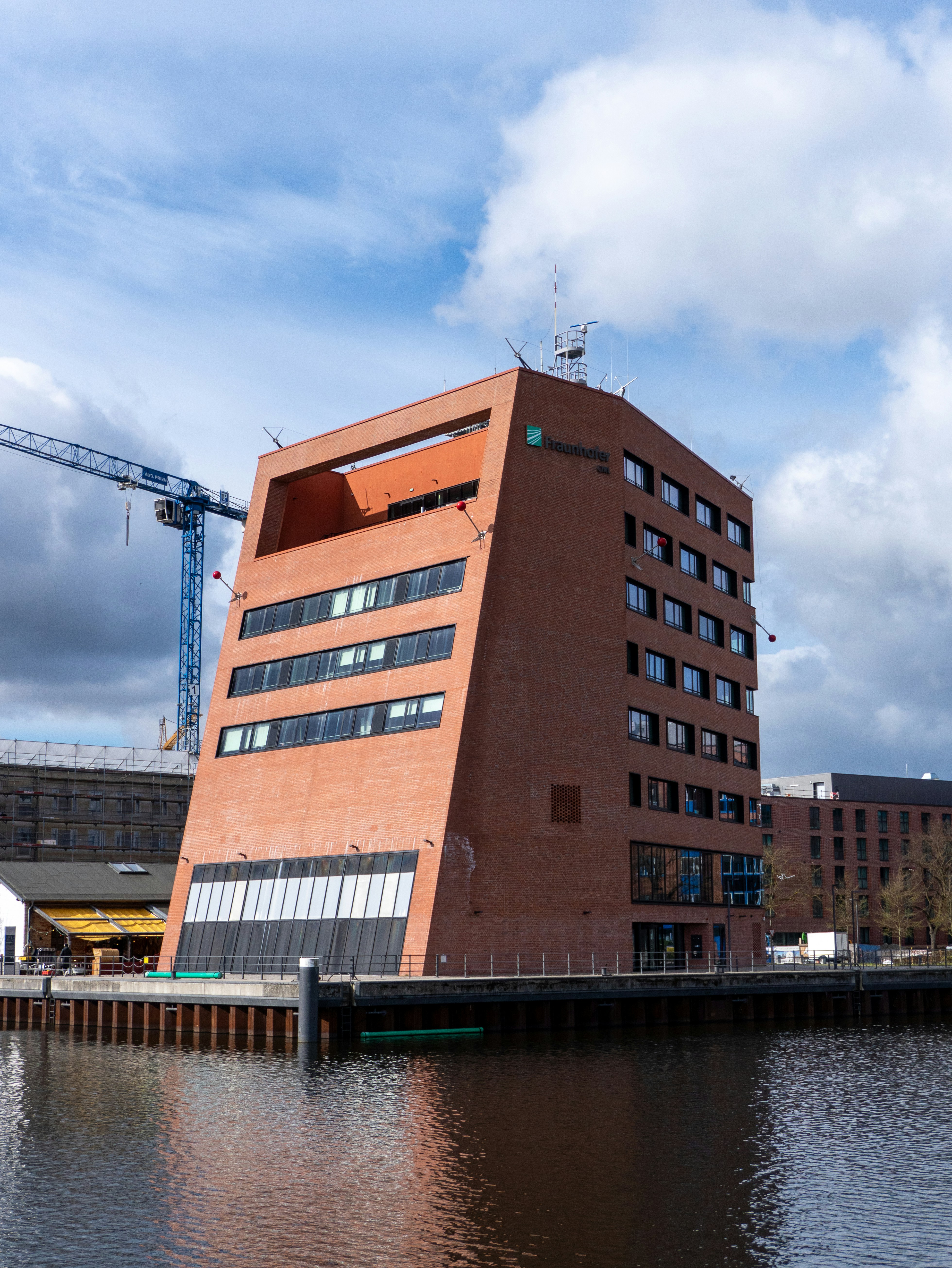 Crimson Brick Edifice Rounding the Waterfront