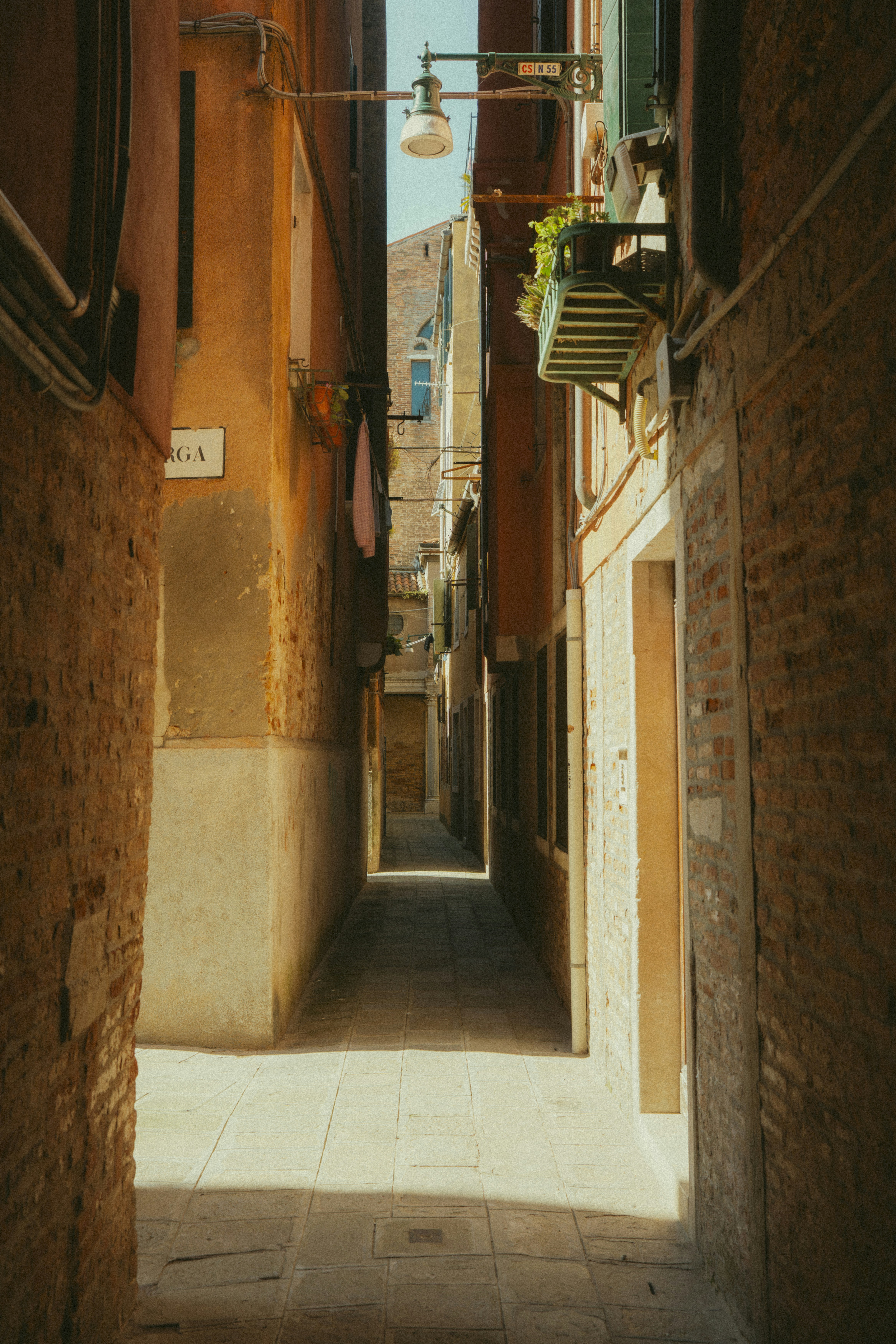 Sunlit Alleyway Through Time