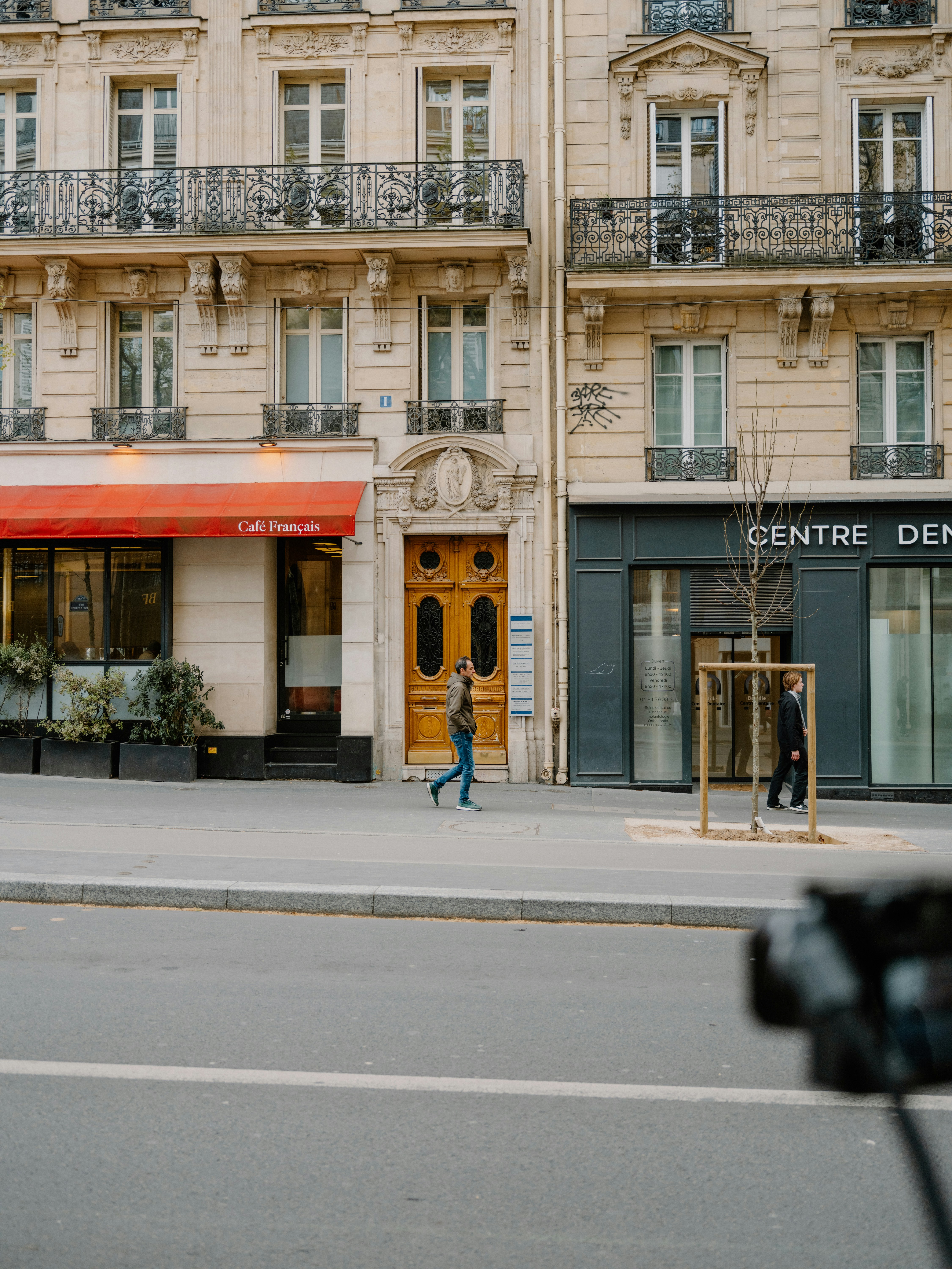 City Street Portrait: A Quiet Moment by the Facades
