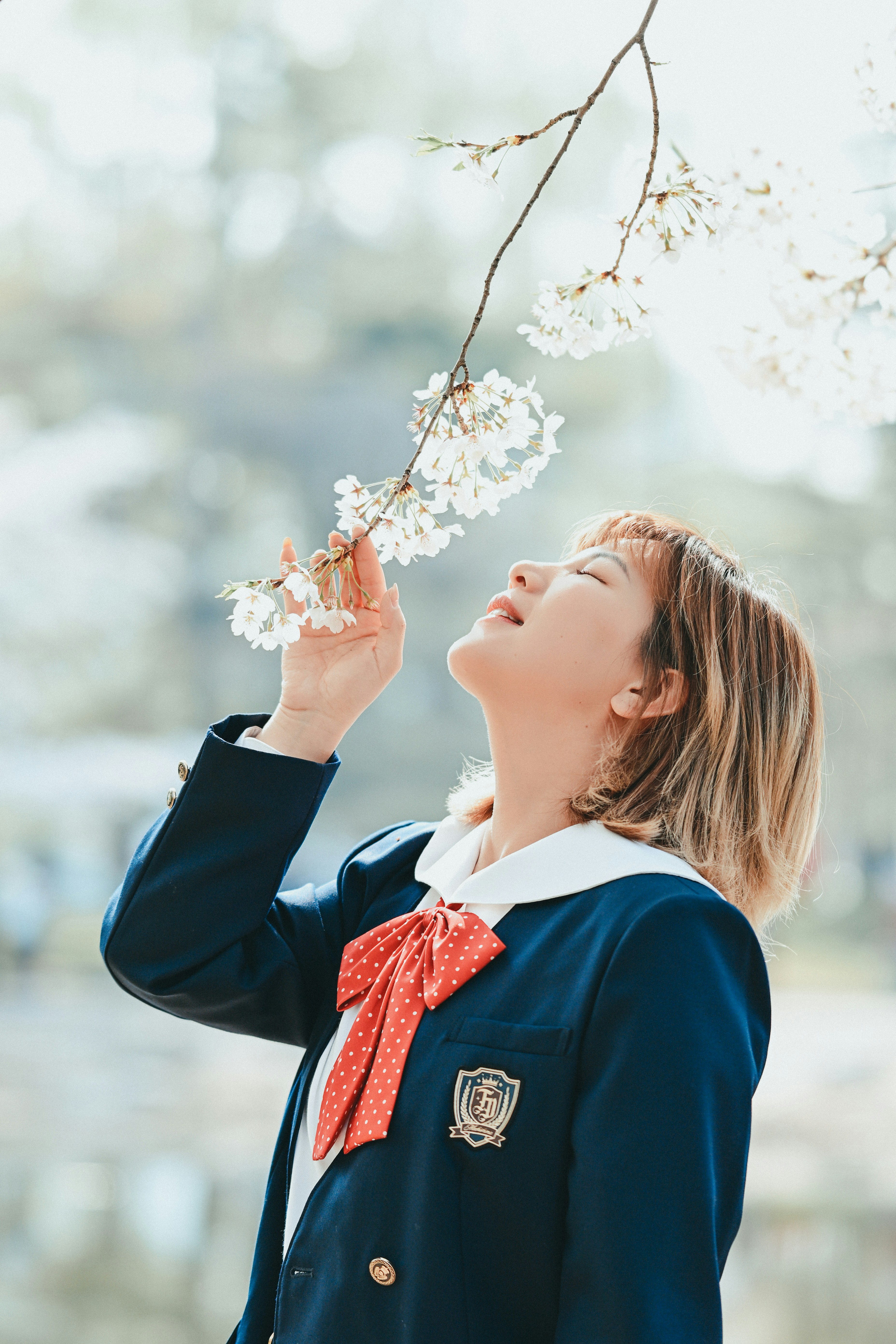 Blossoms and Brightness: A Quiet Moment in Uniform Blue