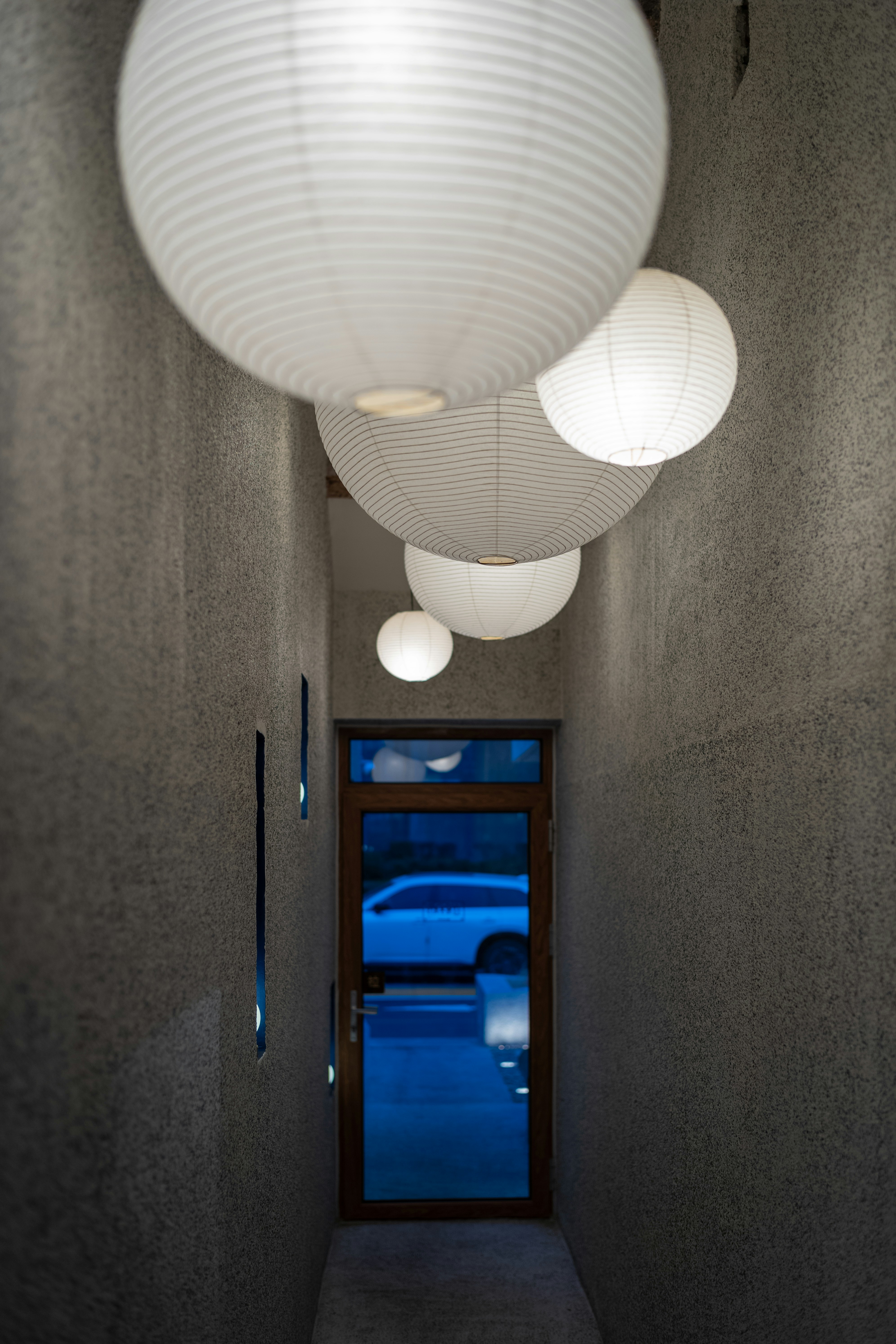 Lantern Corridor: A Quiet Descent Through Neon Blue Light