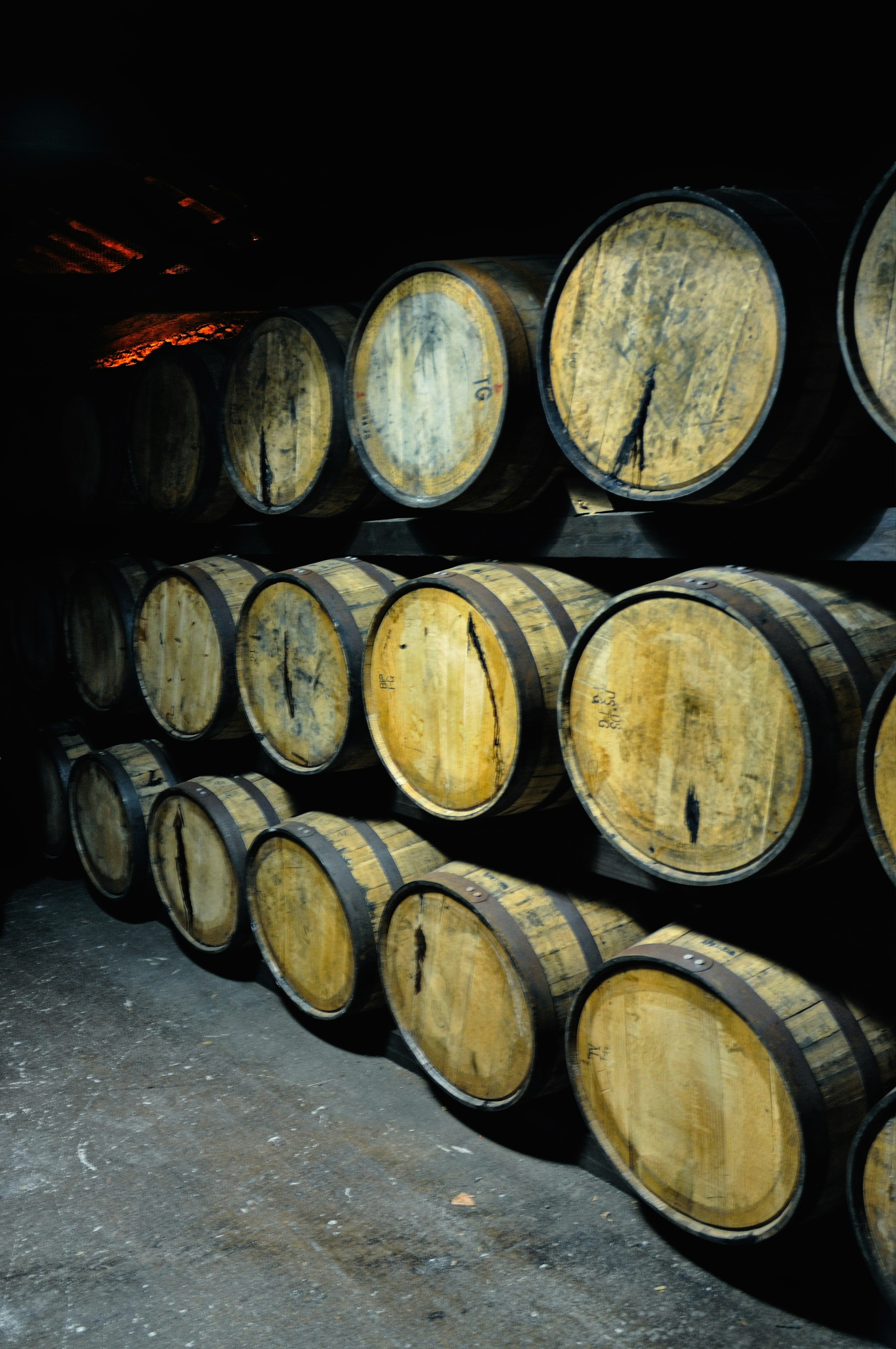 Barrel-lined Cellar: A Quiet Stack of Timeworn Casks