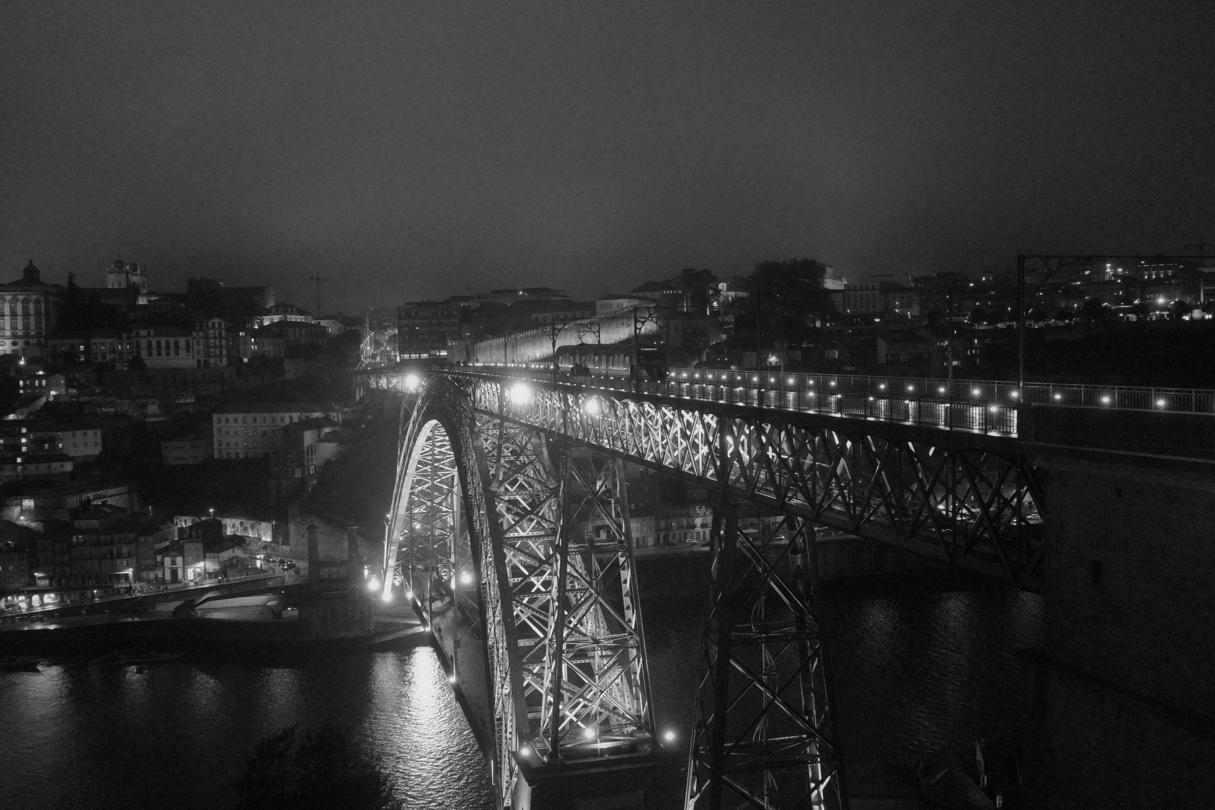 Nighttime Iron Veil: A City Bridge in Quiet Focus