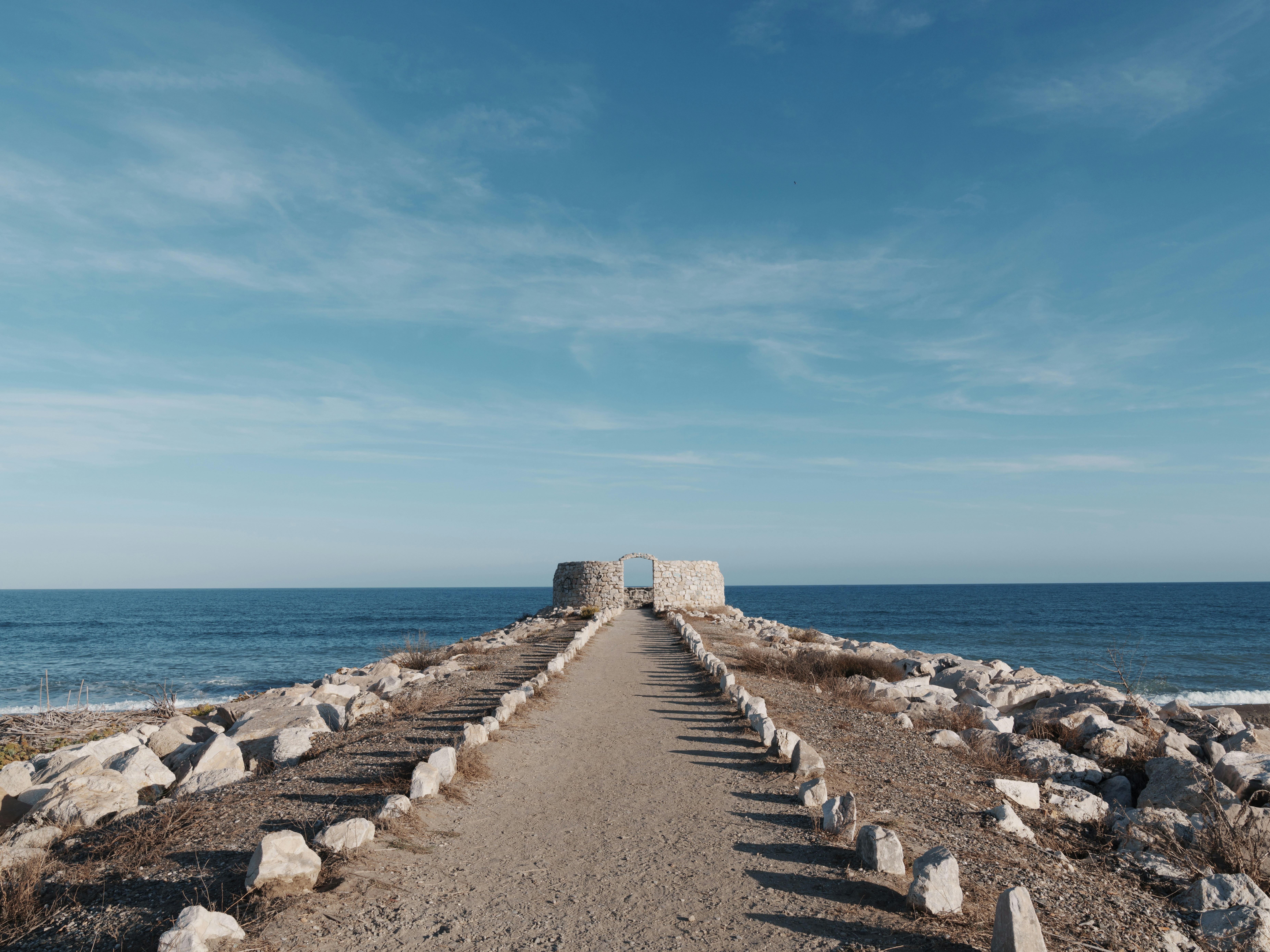 End of the Pier: A Sea Path Toward the Horizon