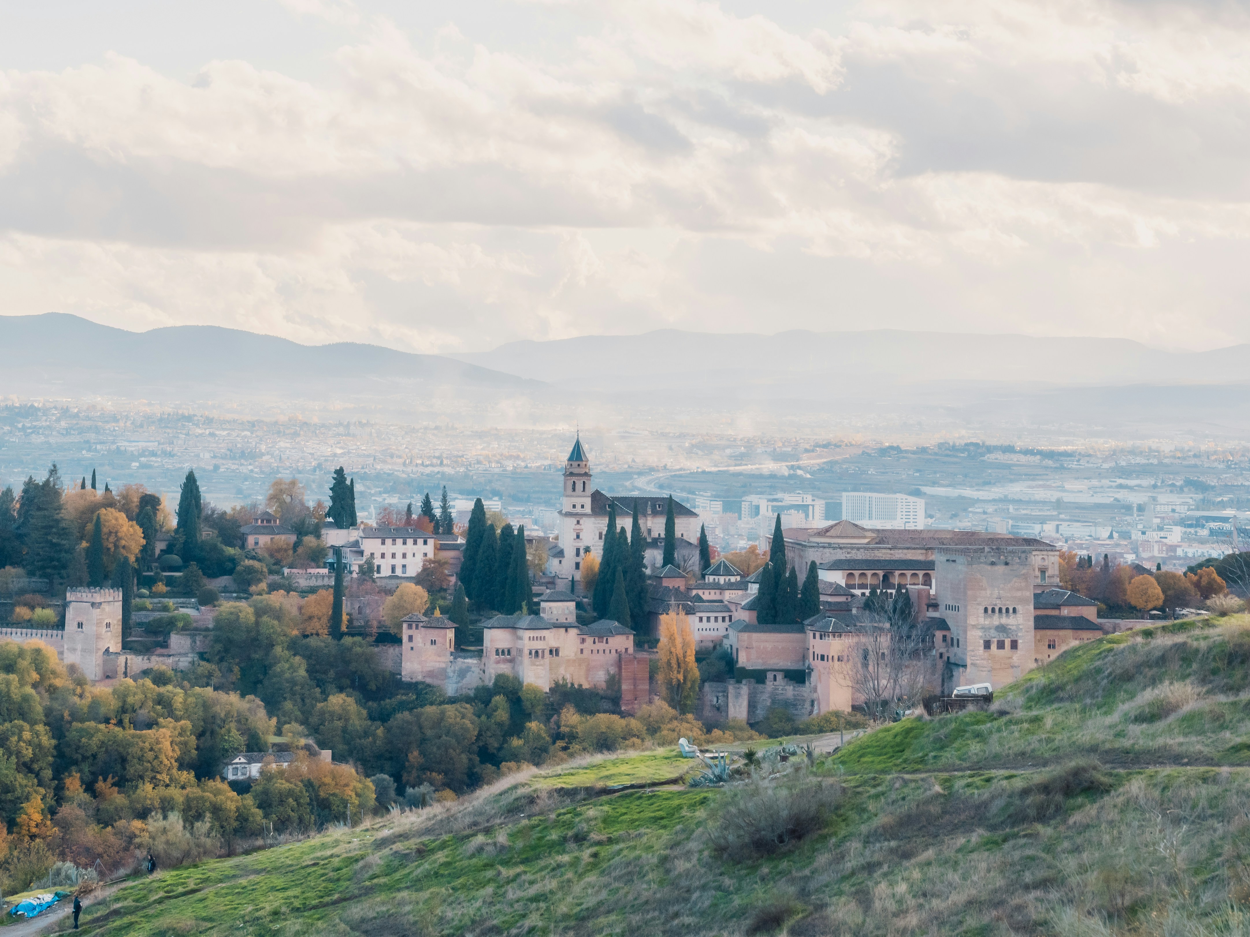 Hilltop Fortress and Village Crowned by Tree-lined Slopes