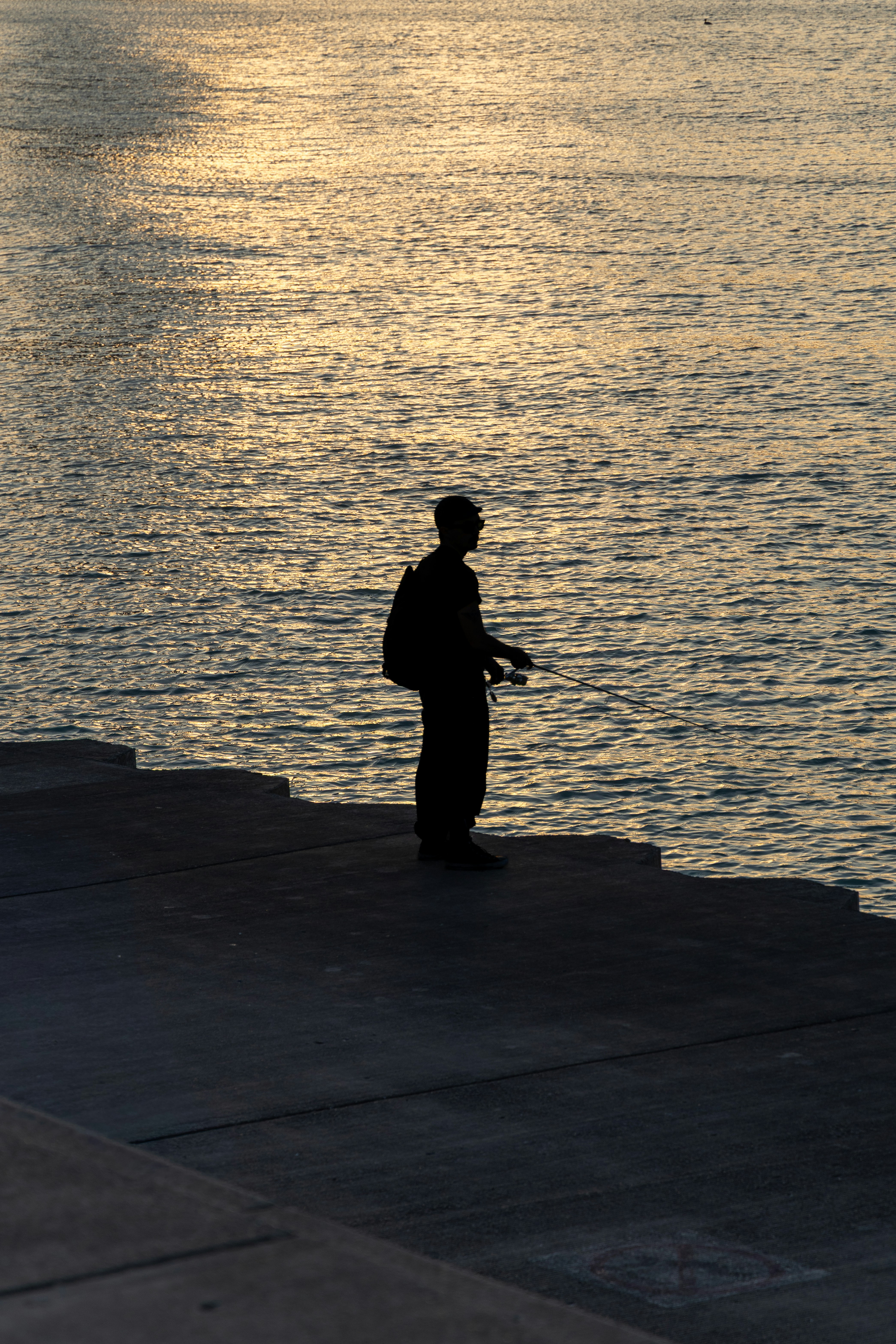 Silhouette on the Pier at Sunset