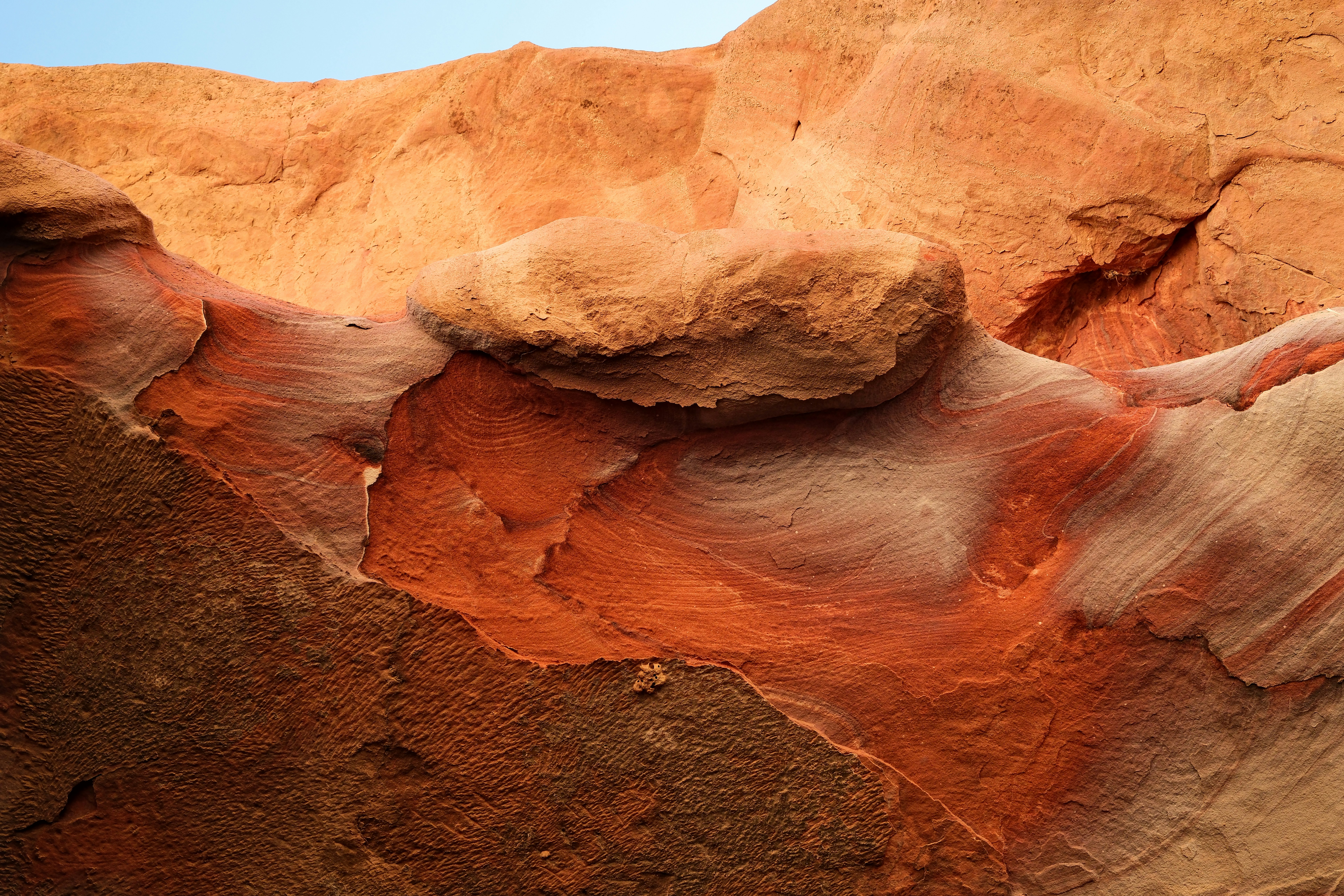 Crimson Strata: Weathered Sediment Carved by Time