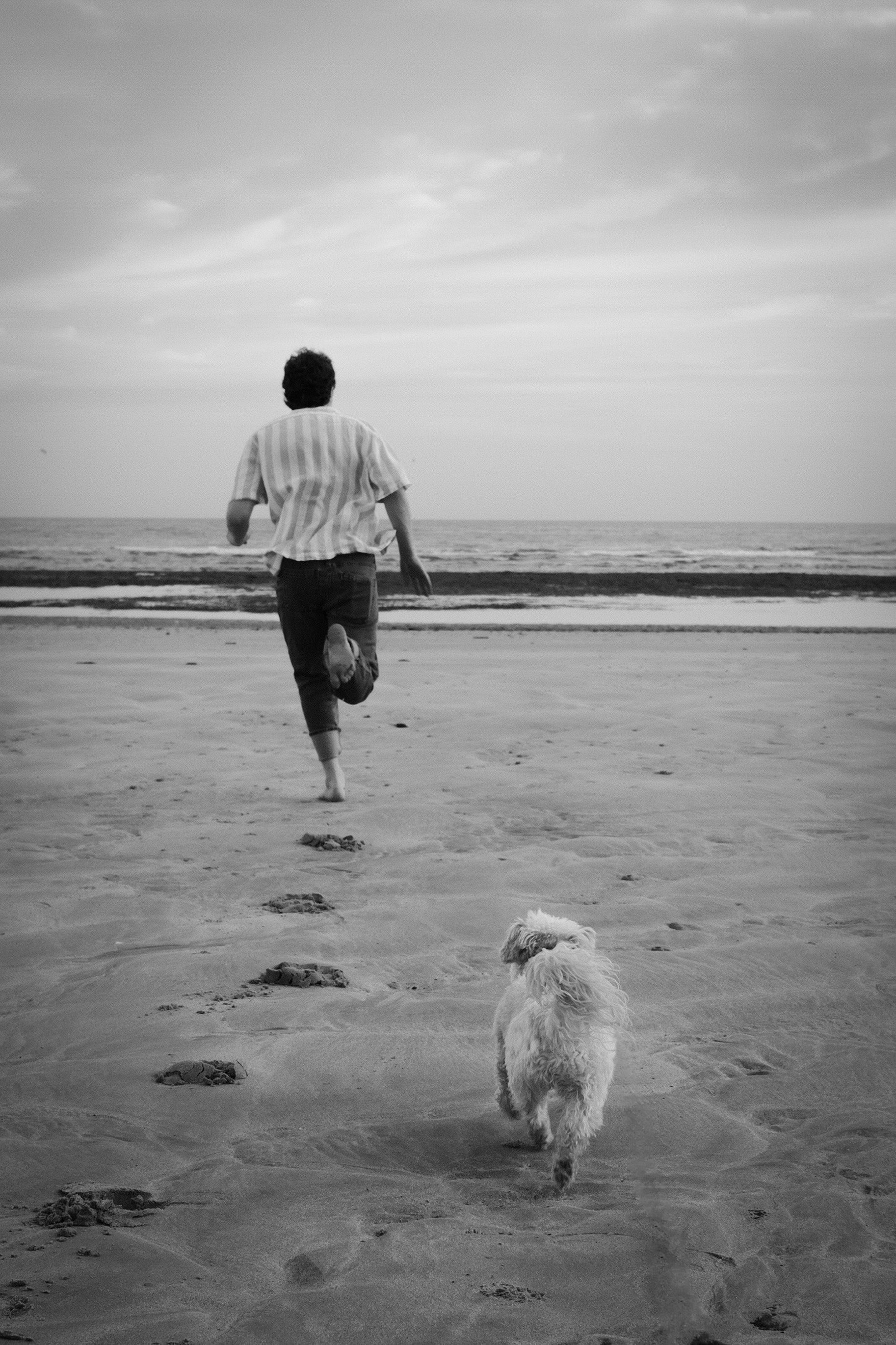 Footprints Behind a Run: A Quiet Beach Escape