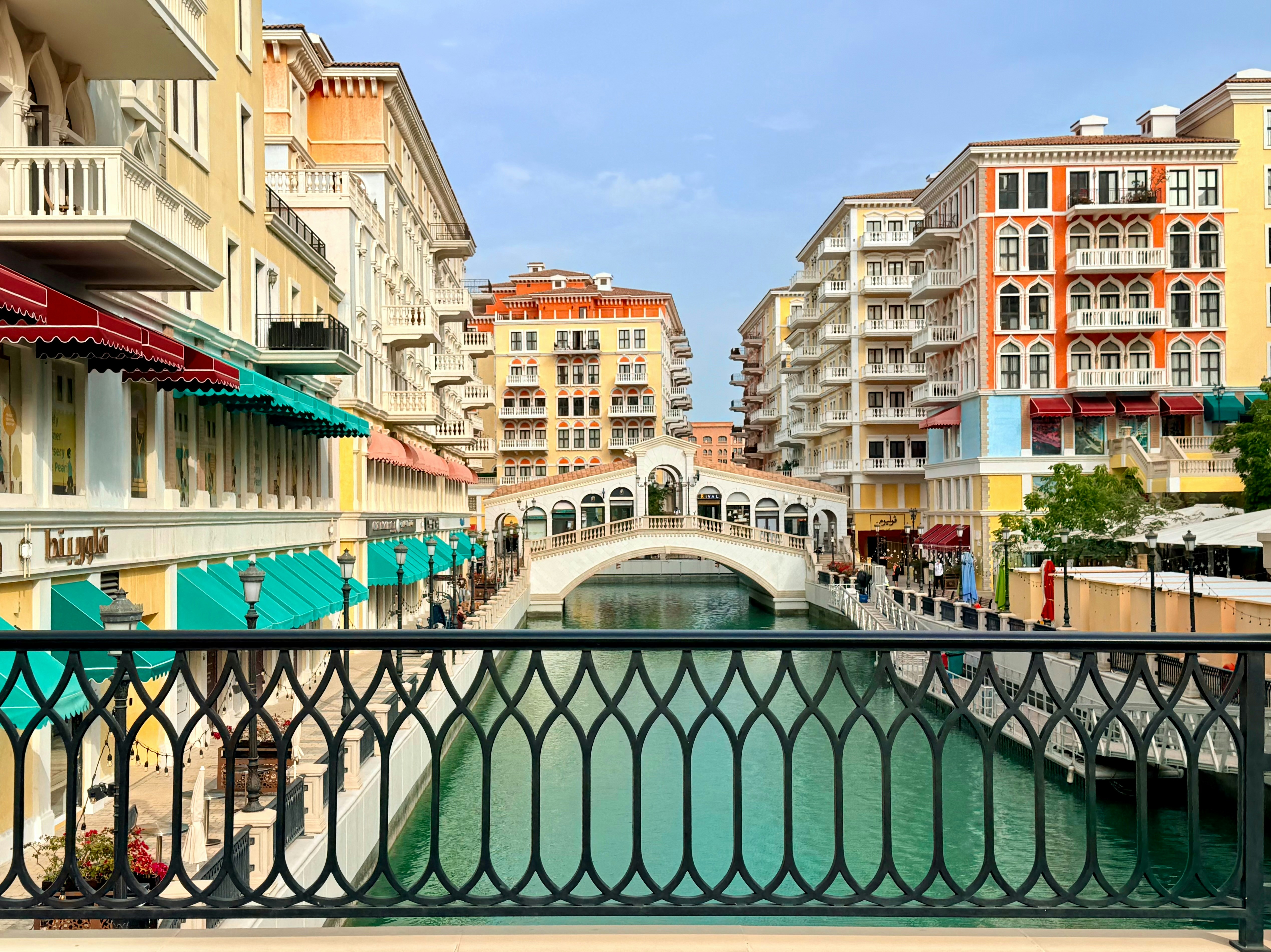 Pastel Crest: A Kanal of Serene Bridges and Sunlit Facades
