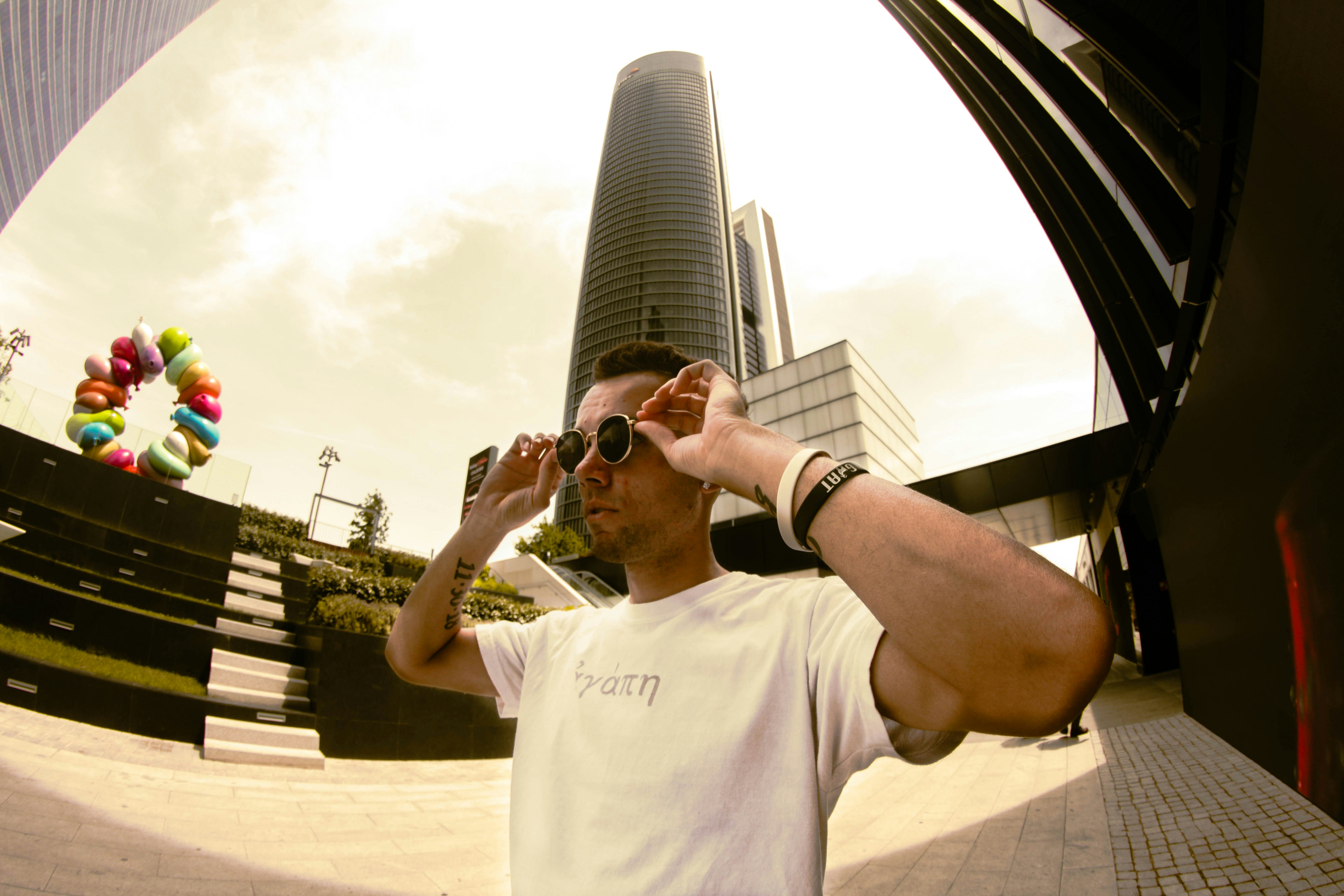 Urban Neon Gaze: A Selfie in the Shadow of Glass Towers