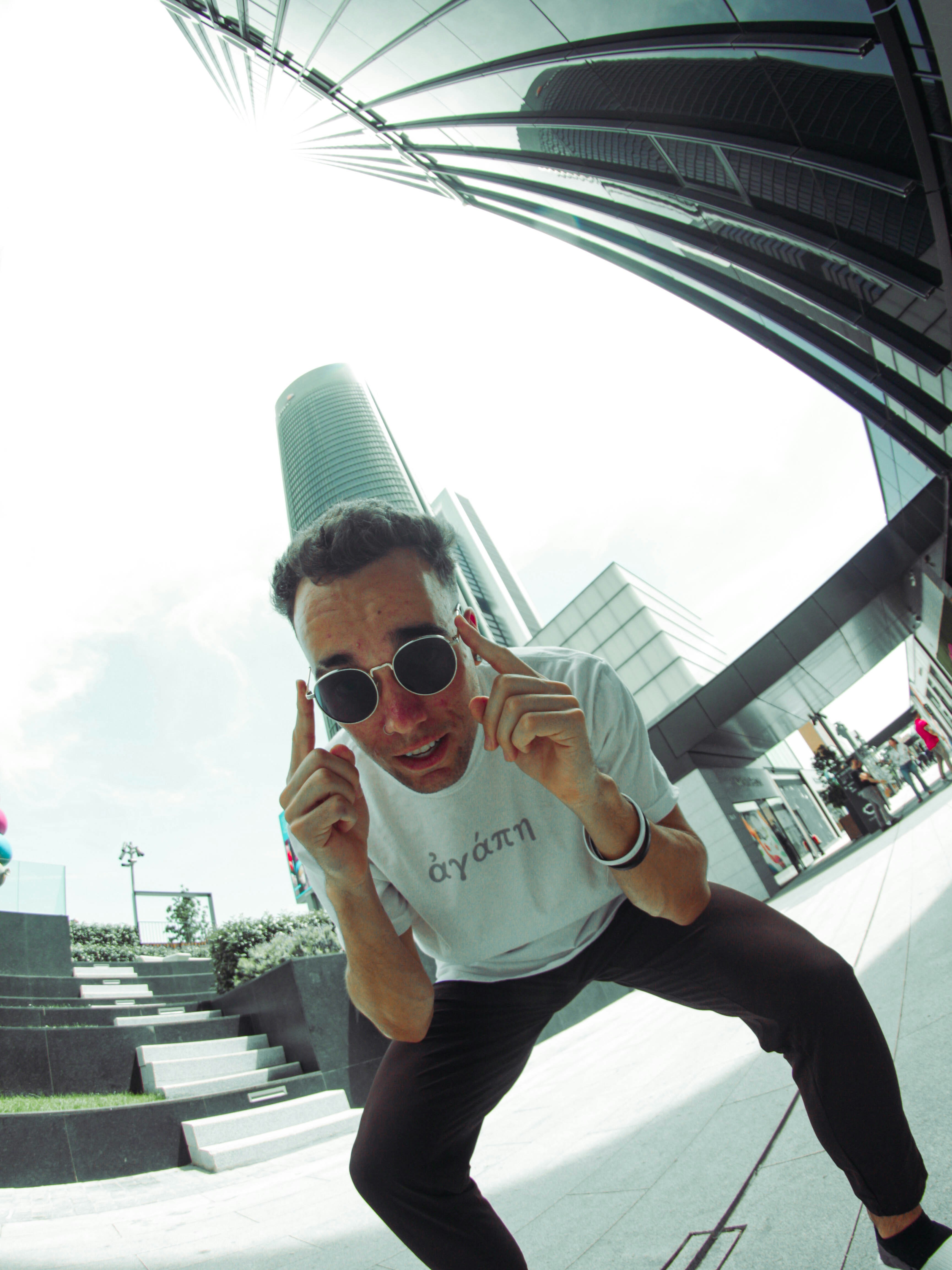 Gleaming City Portrait: A Playful Bend Toward the Lens