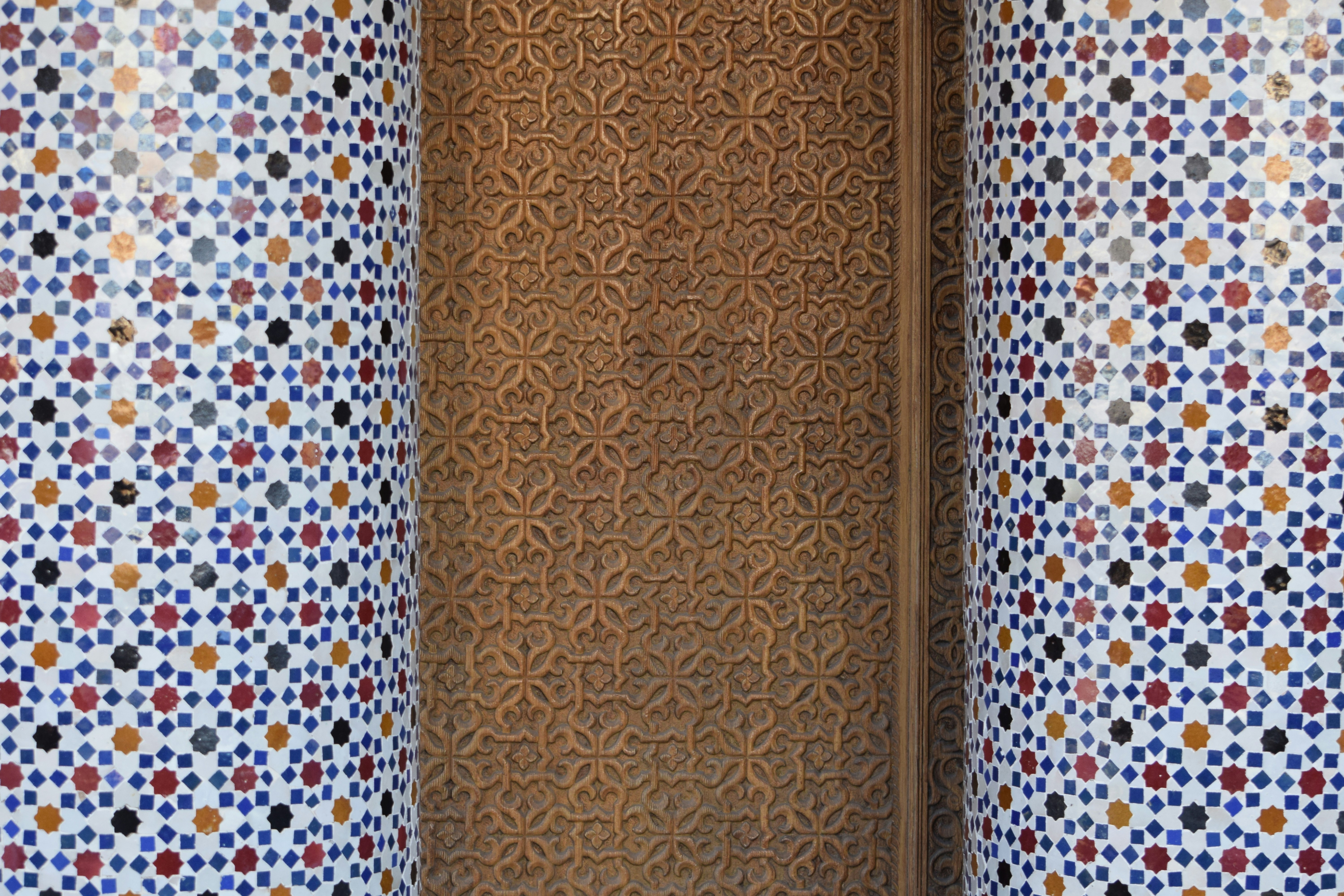 Between Carved Bronze Panels and Mosaic Columns