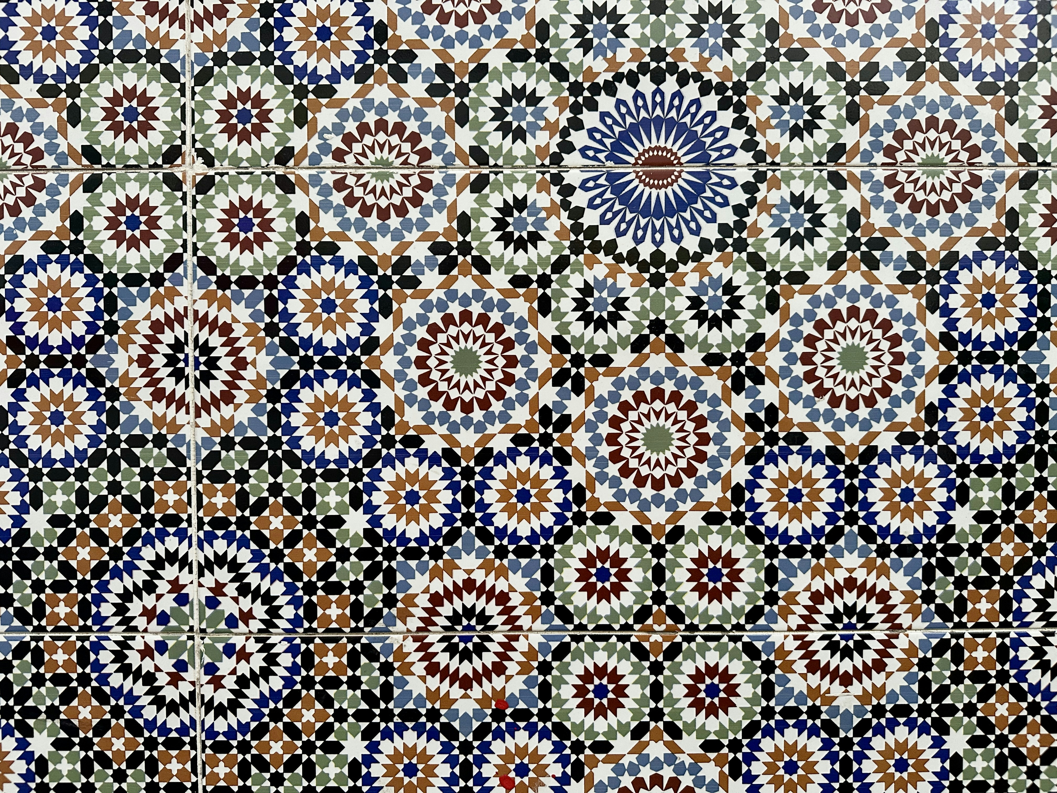 Geometric Kaleidoscope: A Tiled Mosaic of Starbursts