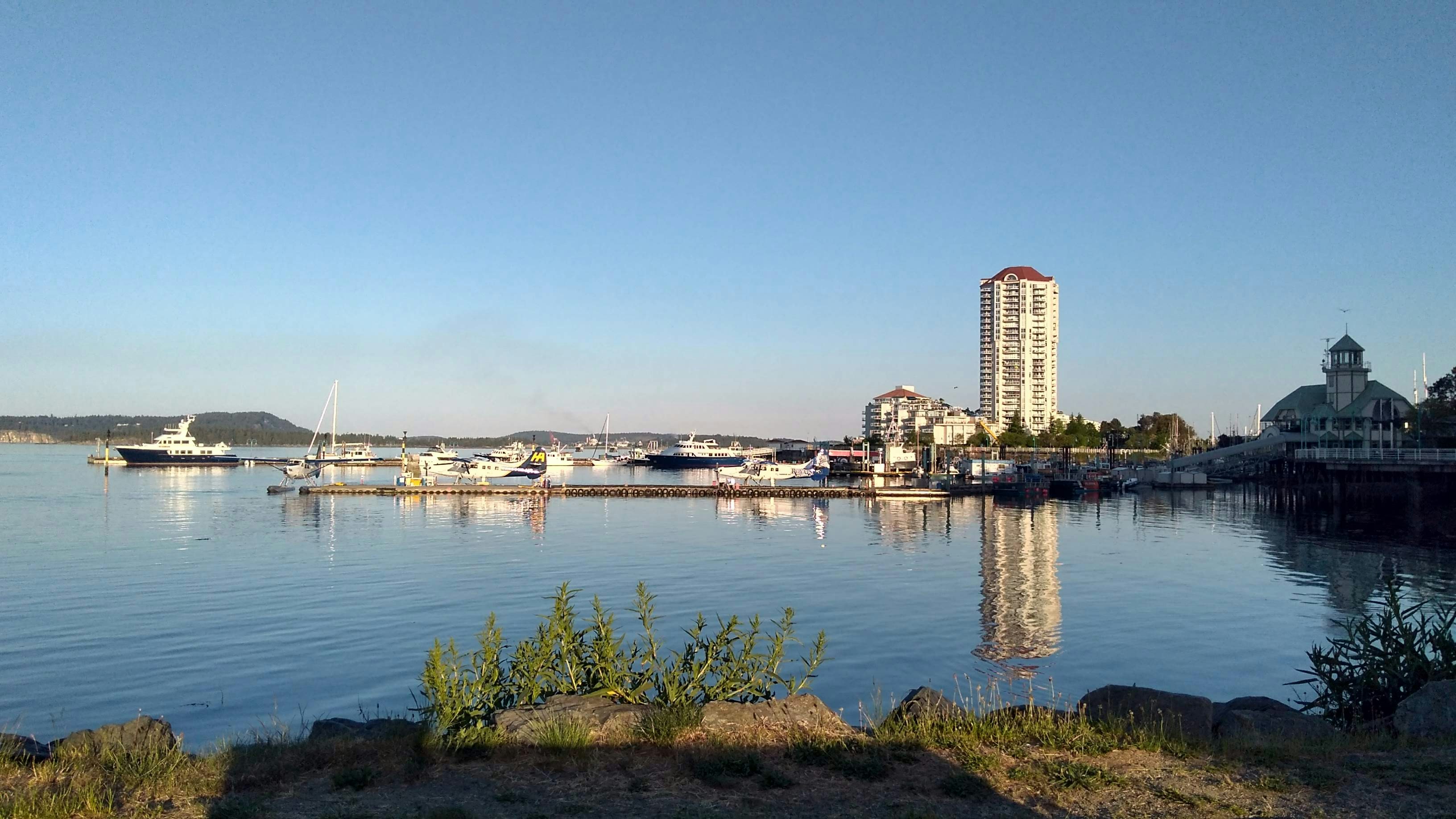 Harbor Silhouette: Boats Rest Along a Quiet Waterfront