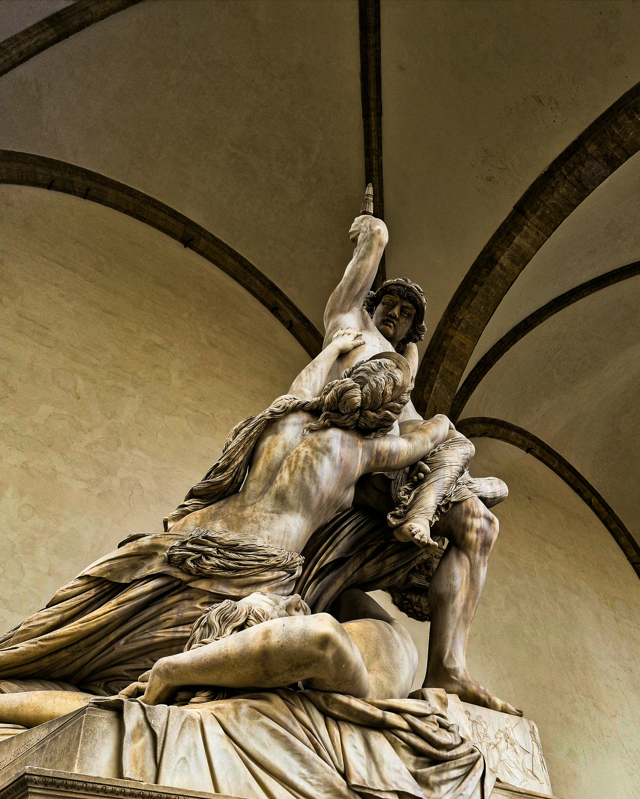 Sculpted Struggle: A Dynamic Ballet of Marble Figures
