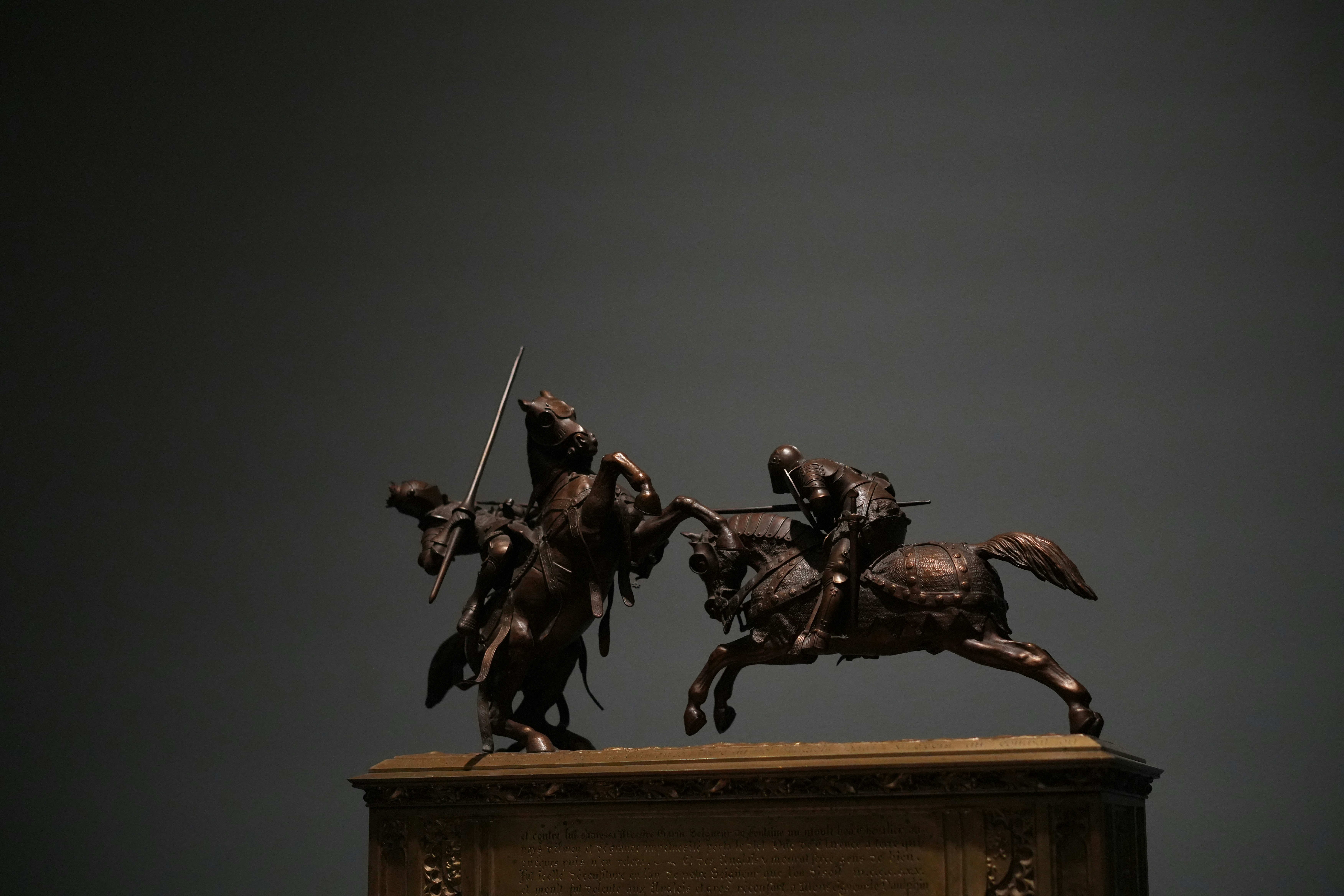 Equestrian Duel: A Bronze Charger and a Knight’s Lunge