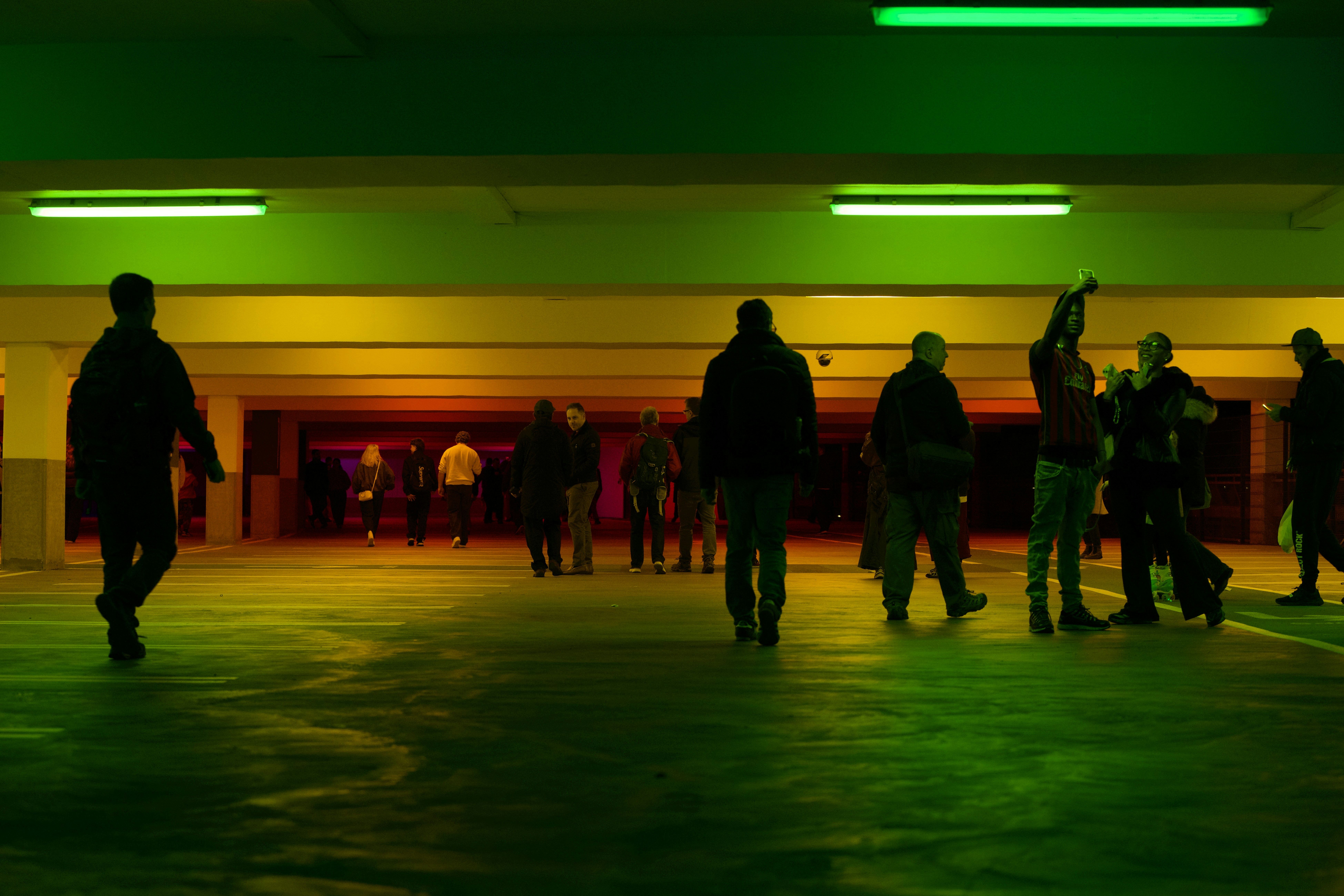 Green Neon Alley: Night Walkers in a Hidden Parking Garage