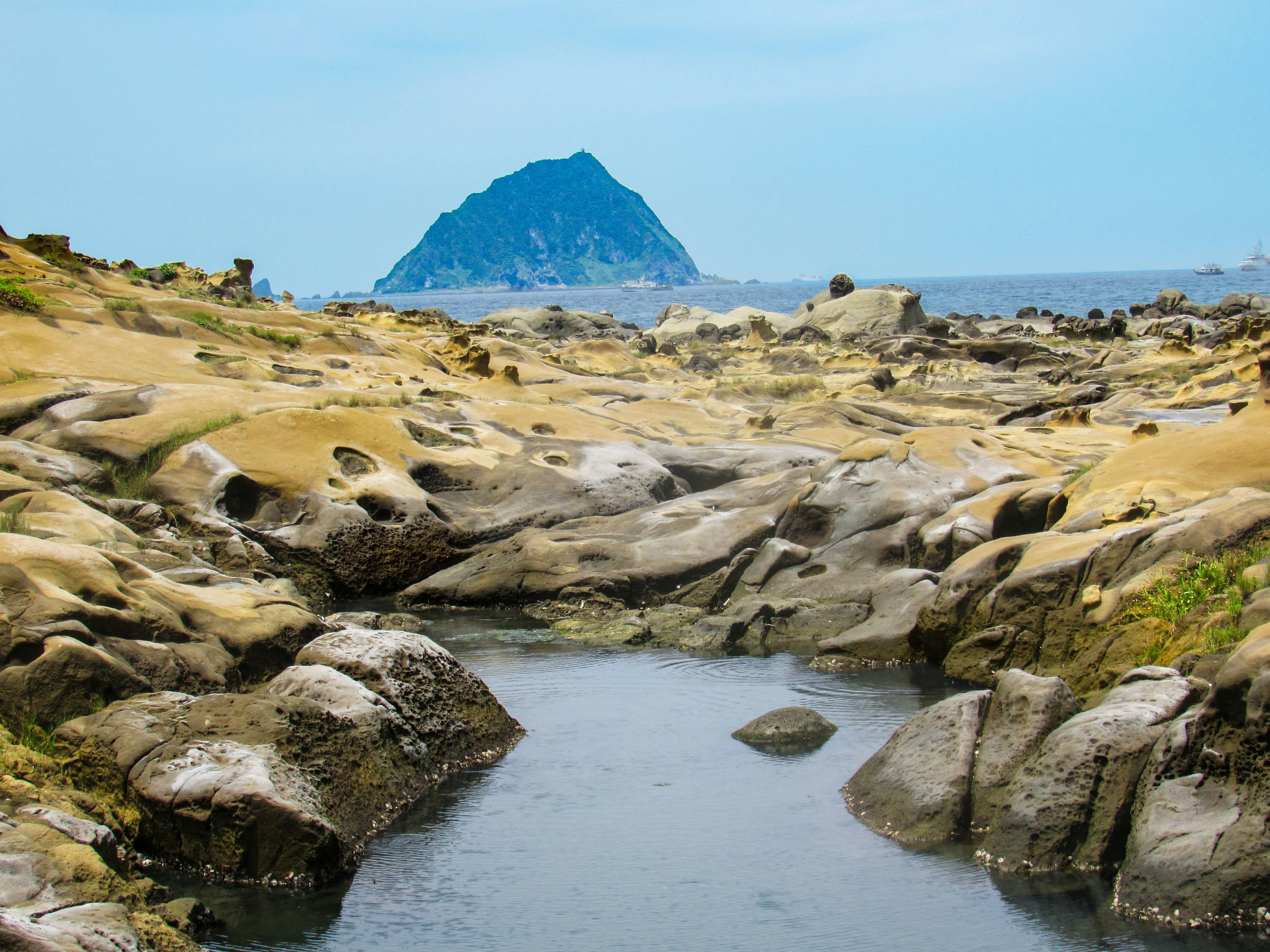 Stone Tides: A Sea-Robed Path to the Islet