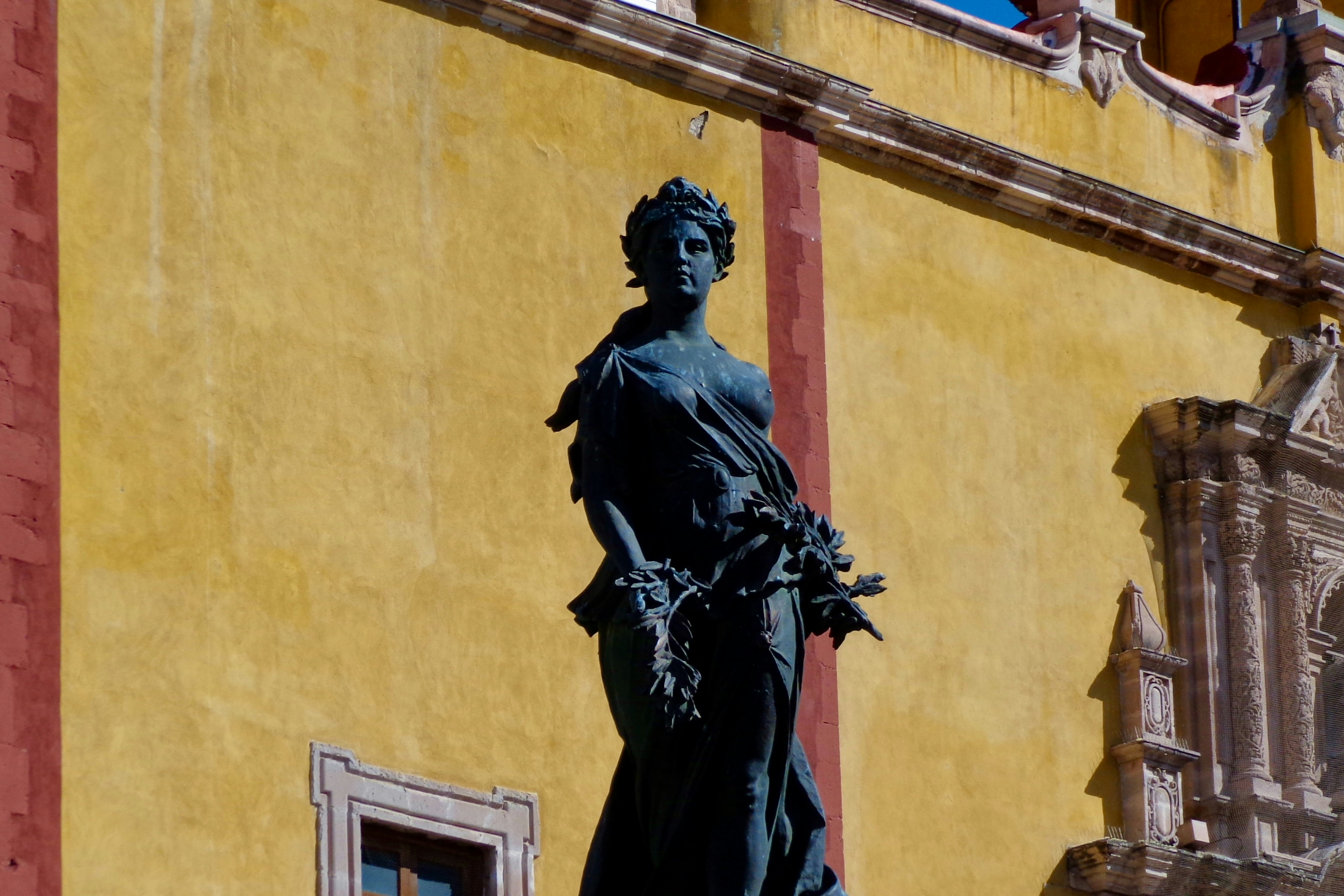 Golden Facade and the Standing Figure