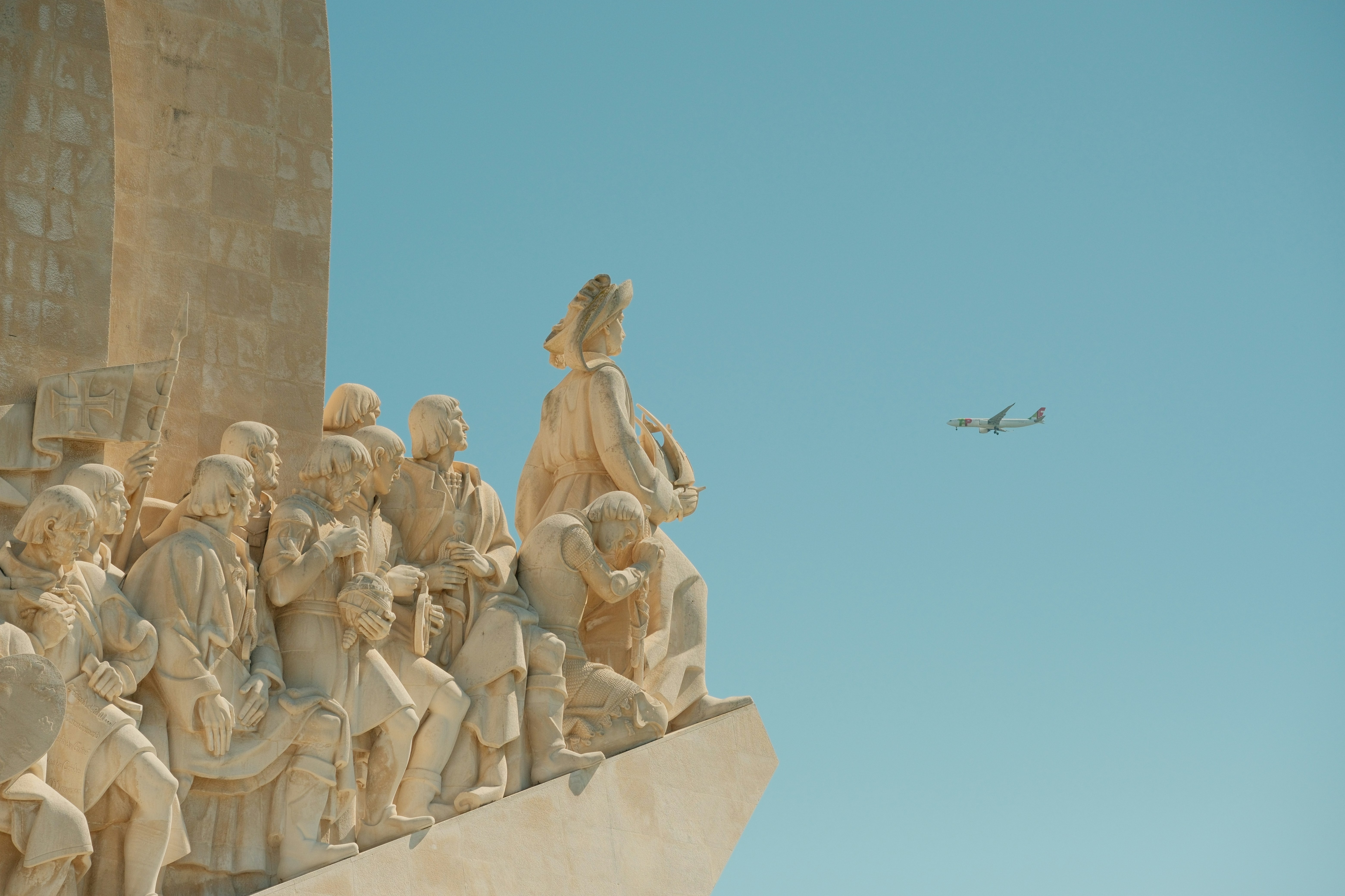 Stone Platform Statuaries against a Skyward Gaze