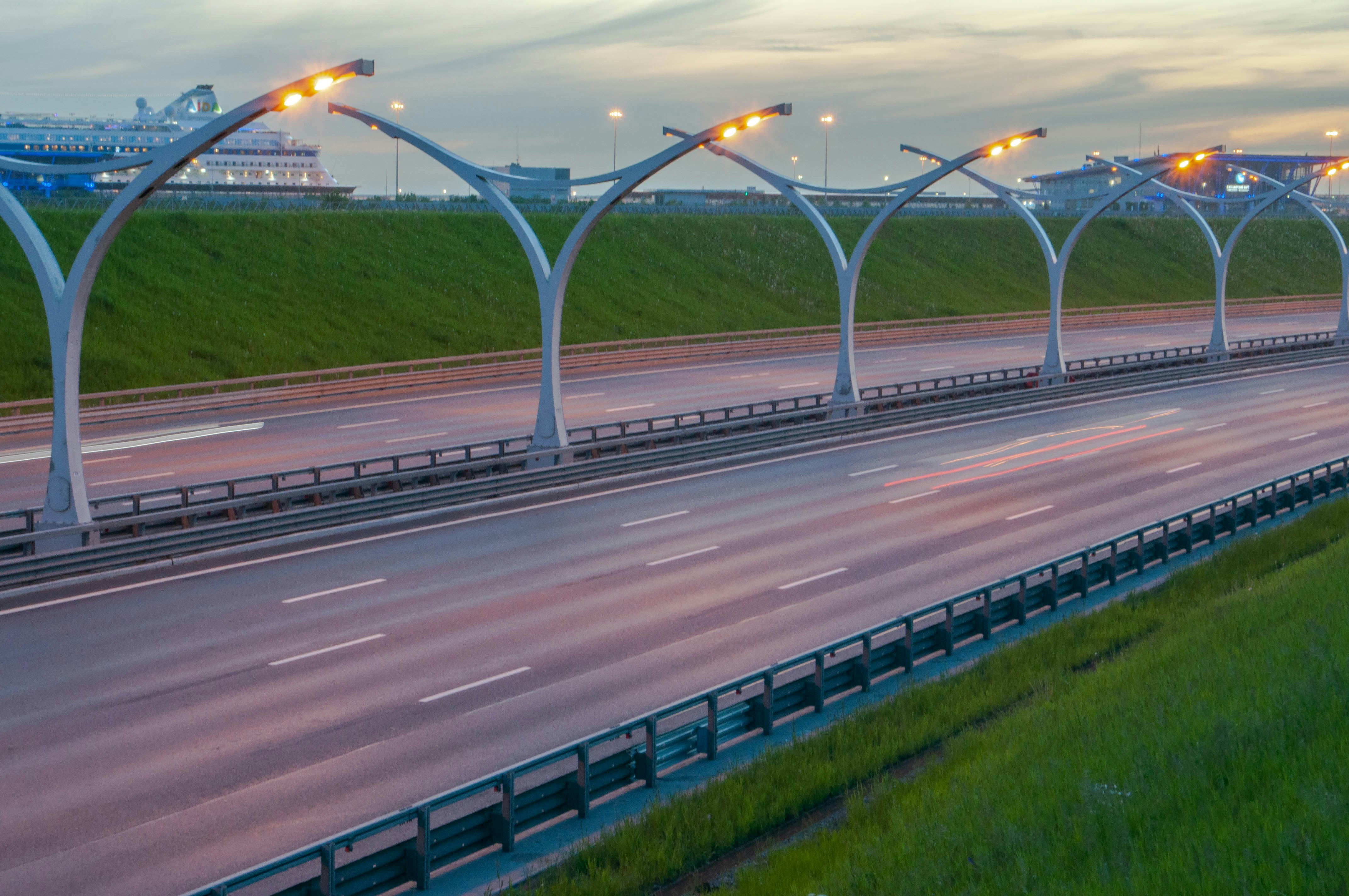 Midday Motion: A Quiet Arc Over a Multilane Highway