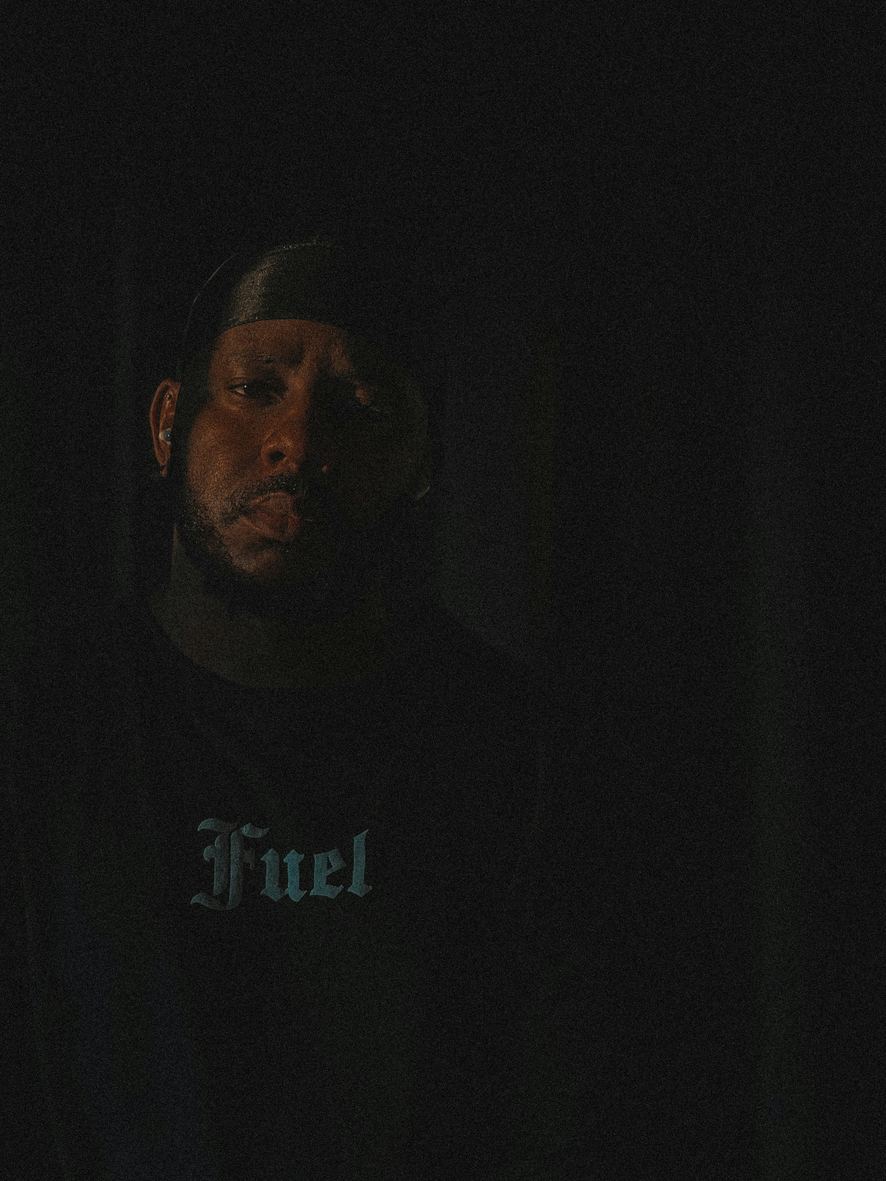 Shadowed Aura: A Quiet Portrait in Low Light