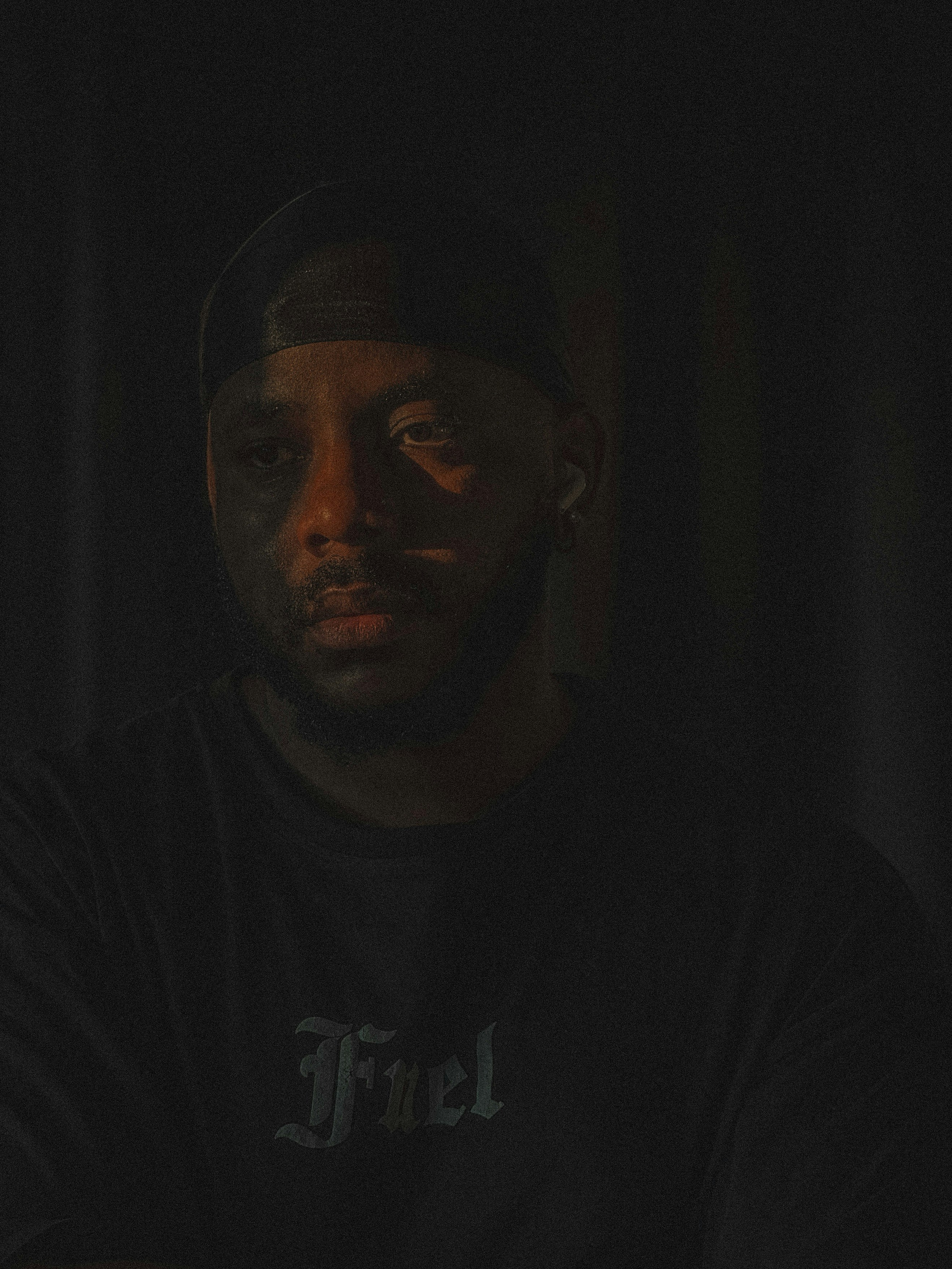 Low-light Portrait: Quiet Contemplation in Shadowed Glow