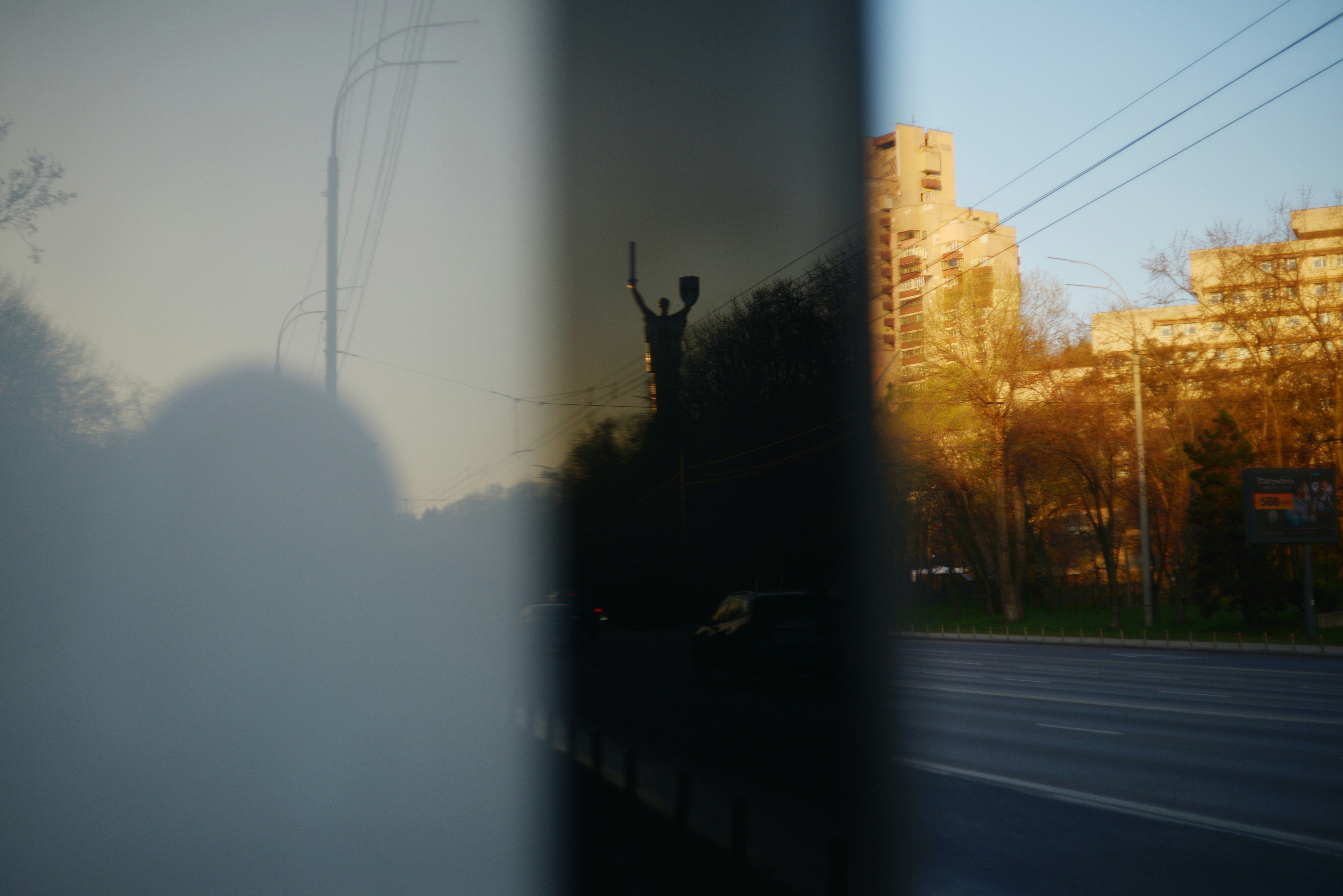 Silhouette of a Traveler in the Window Gap