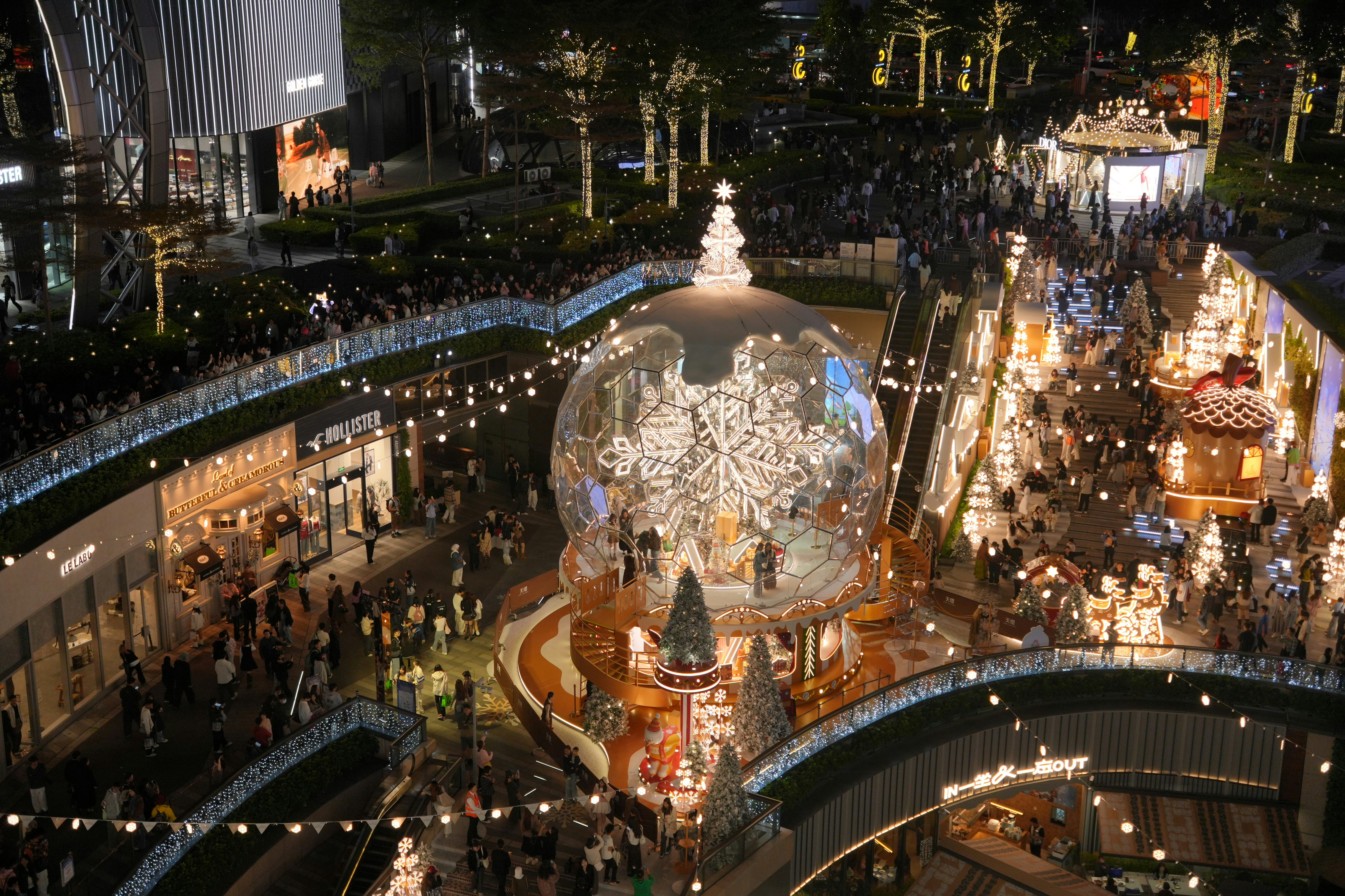 Glass Snow Globe at the Heart of a Festive Atrium