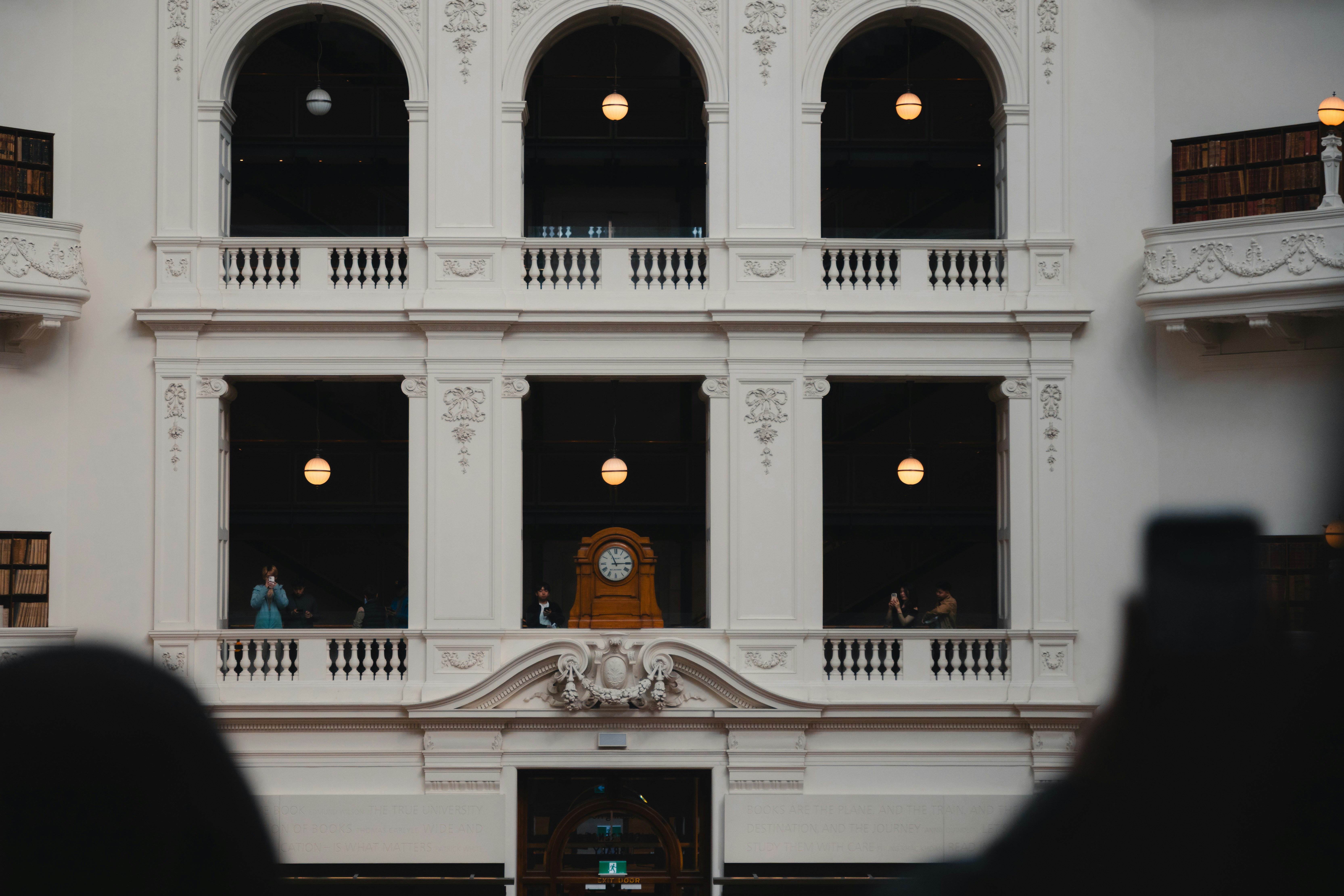 Clockwork Silhouettes on a Marble Veranda