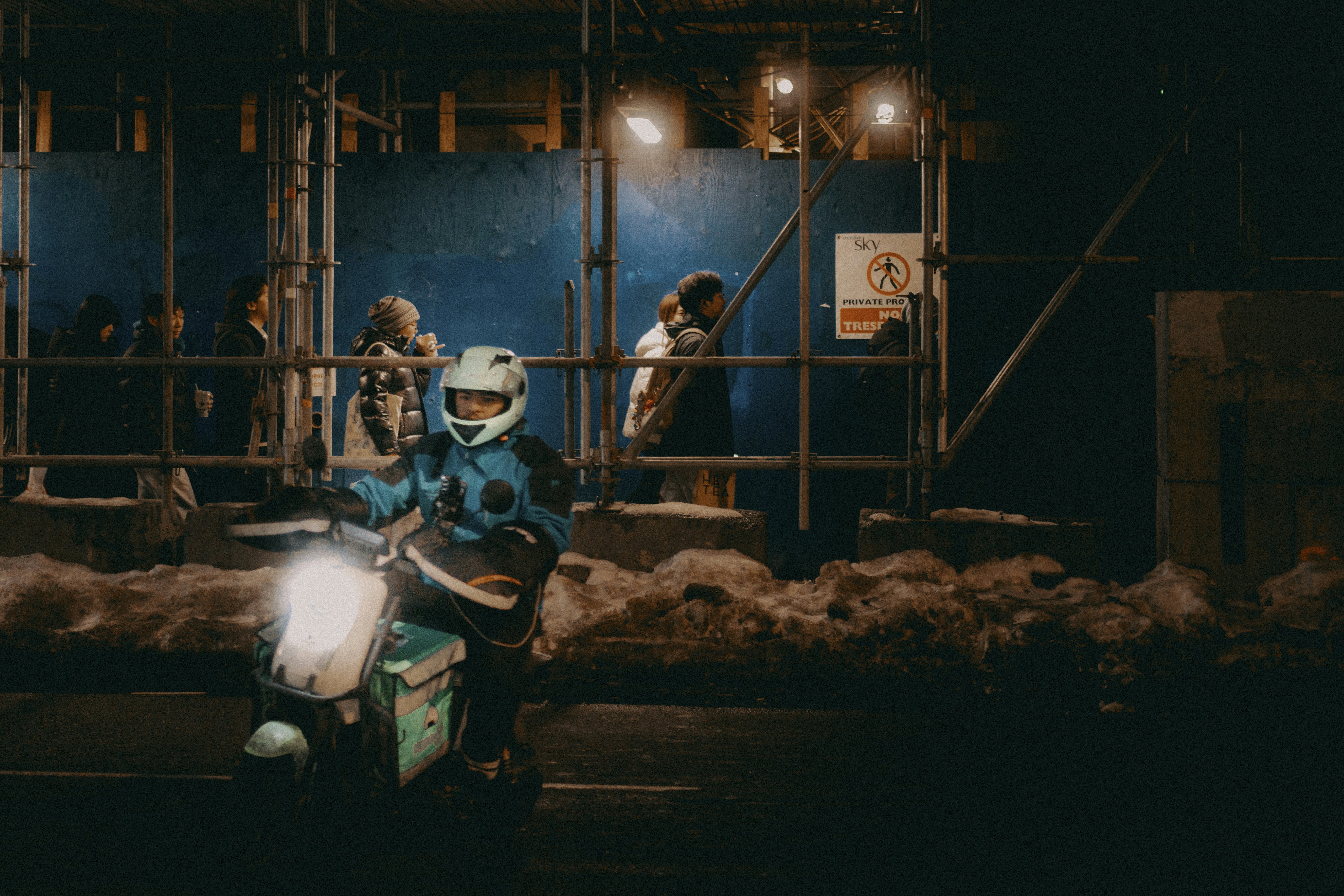 Night Messenger: Neon Rider Under Industrial Glow