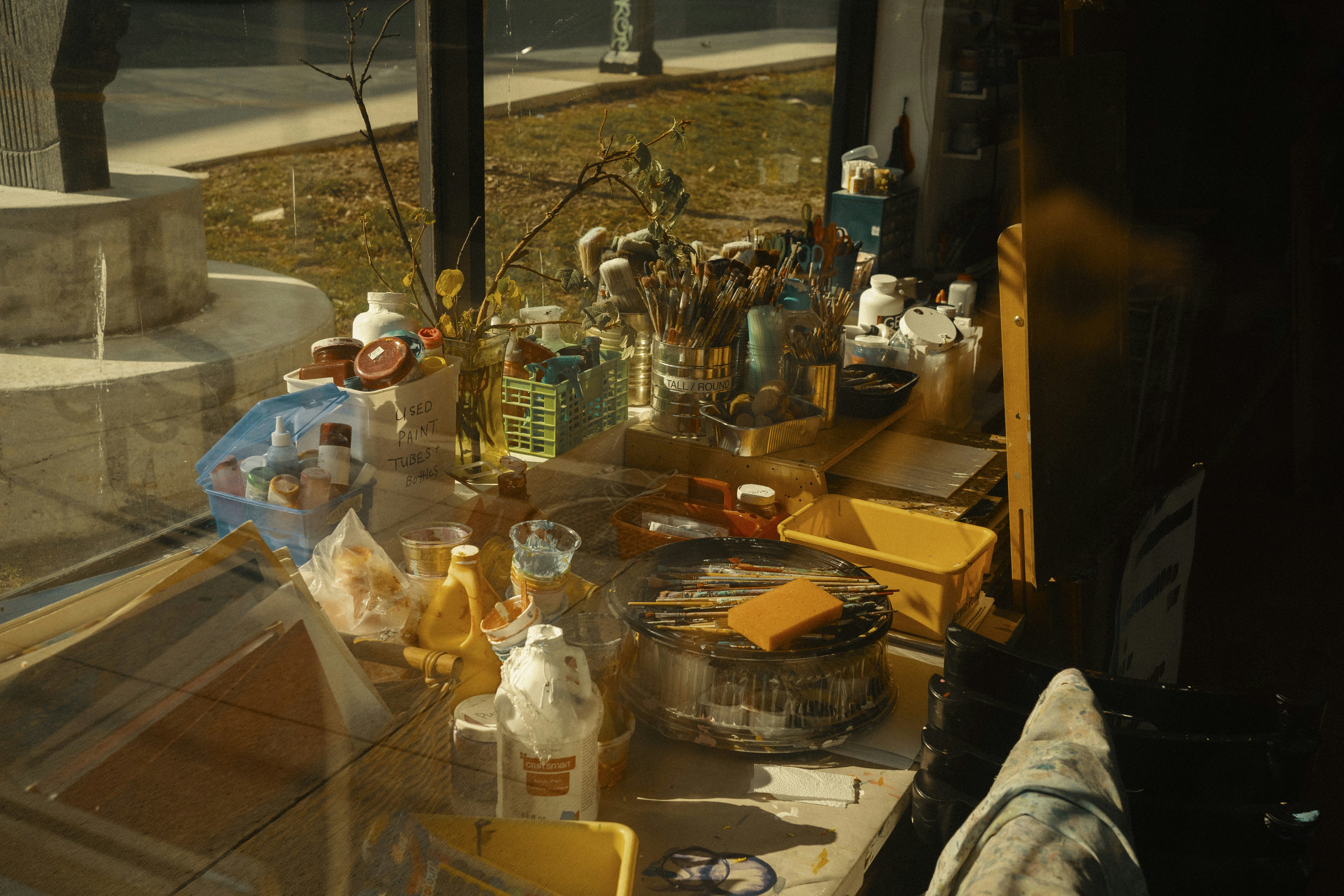 Painted Reflections: A Studio Still Life in a Café Window