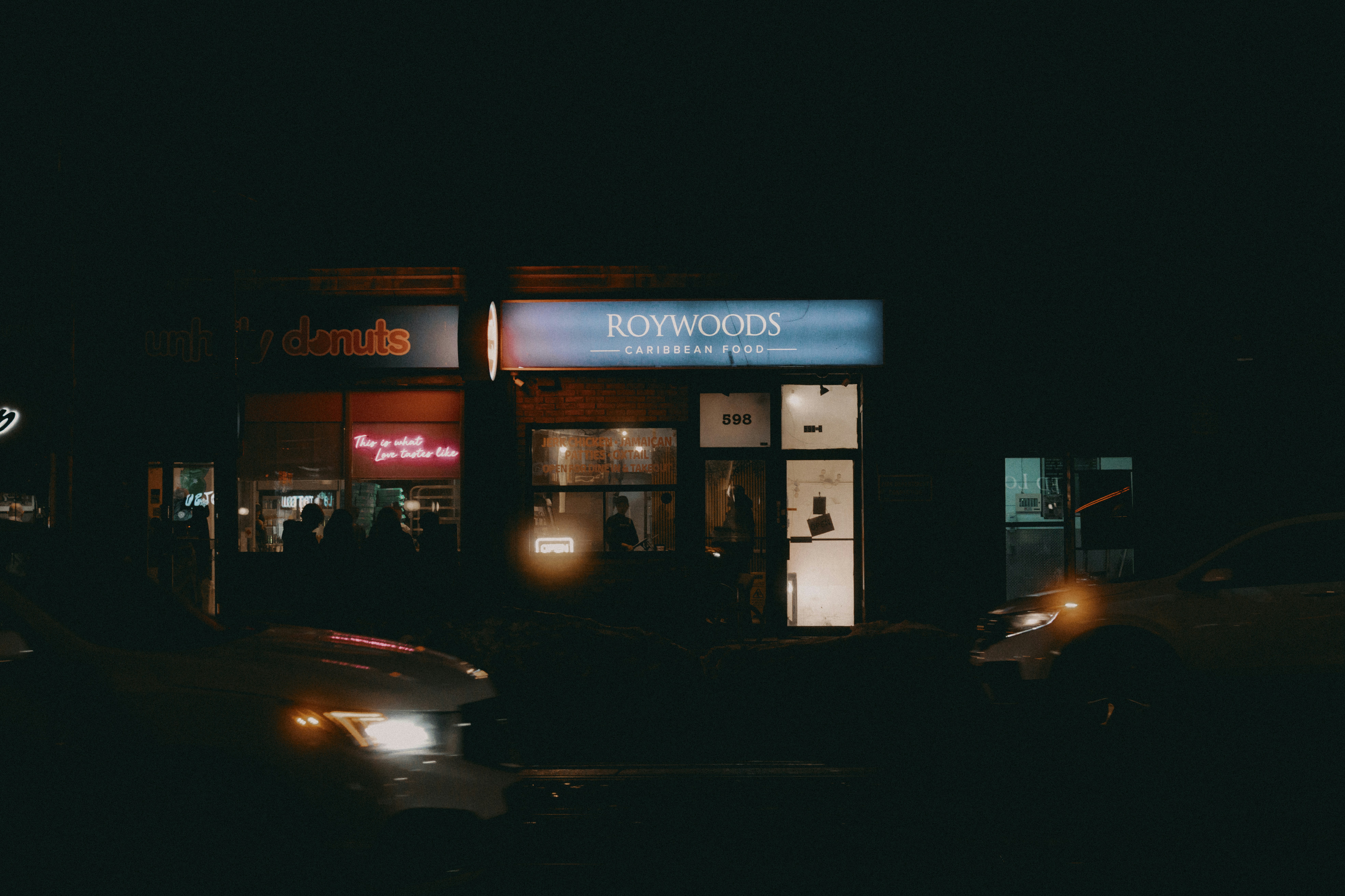 Night Market Glow: A Quiet Streetfront with Neon Signage