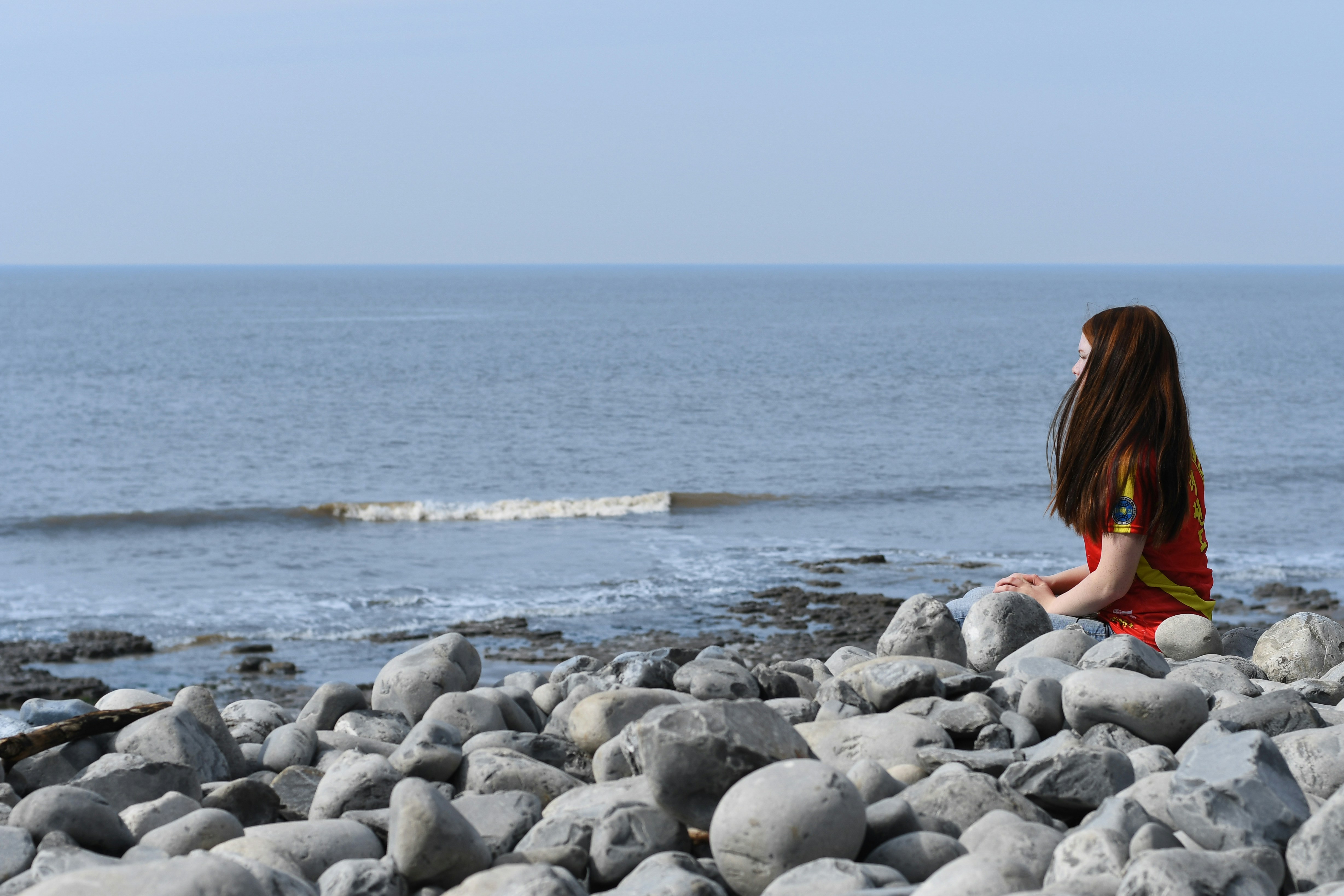 Lone Seeker on the Pebble Beach