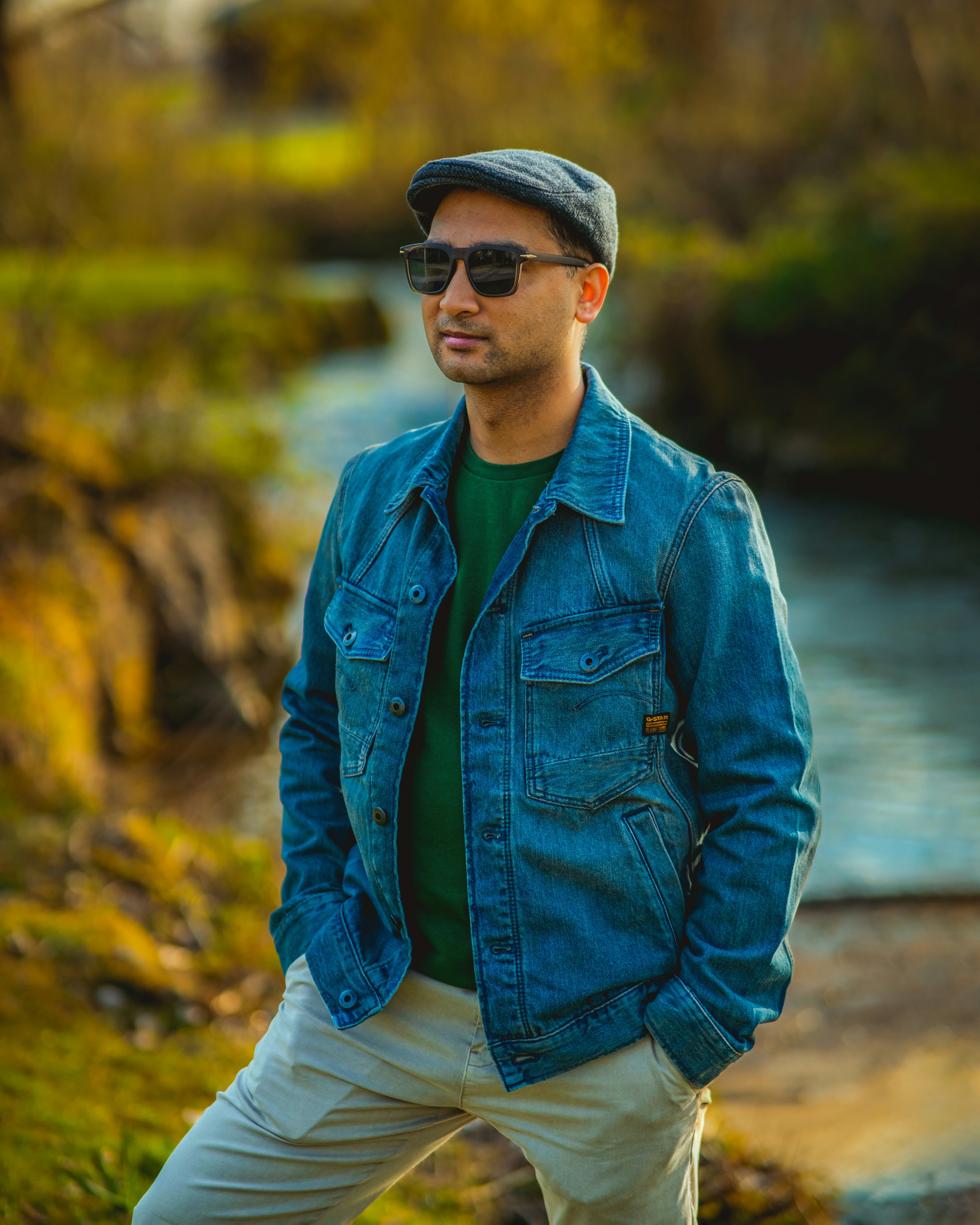  denim-clad portrait by the riverbank at golden hour