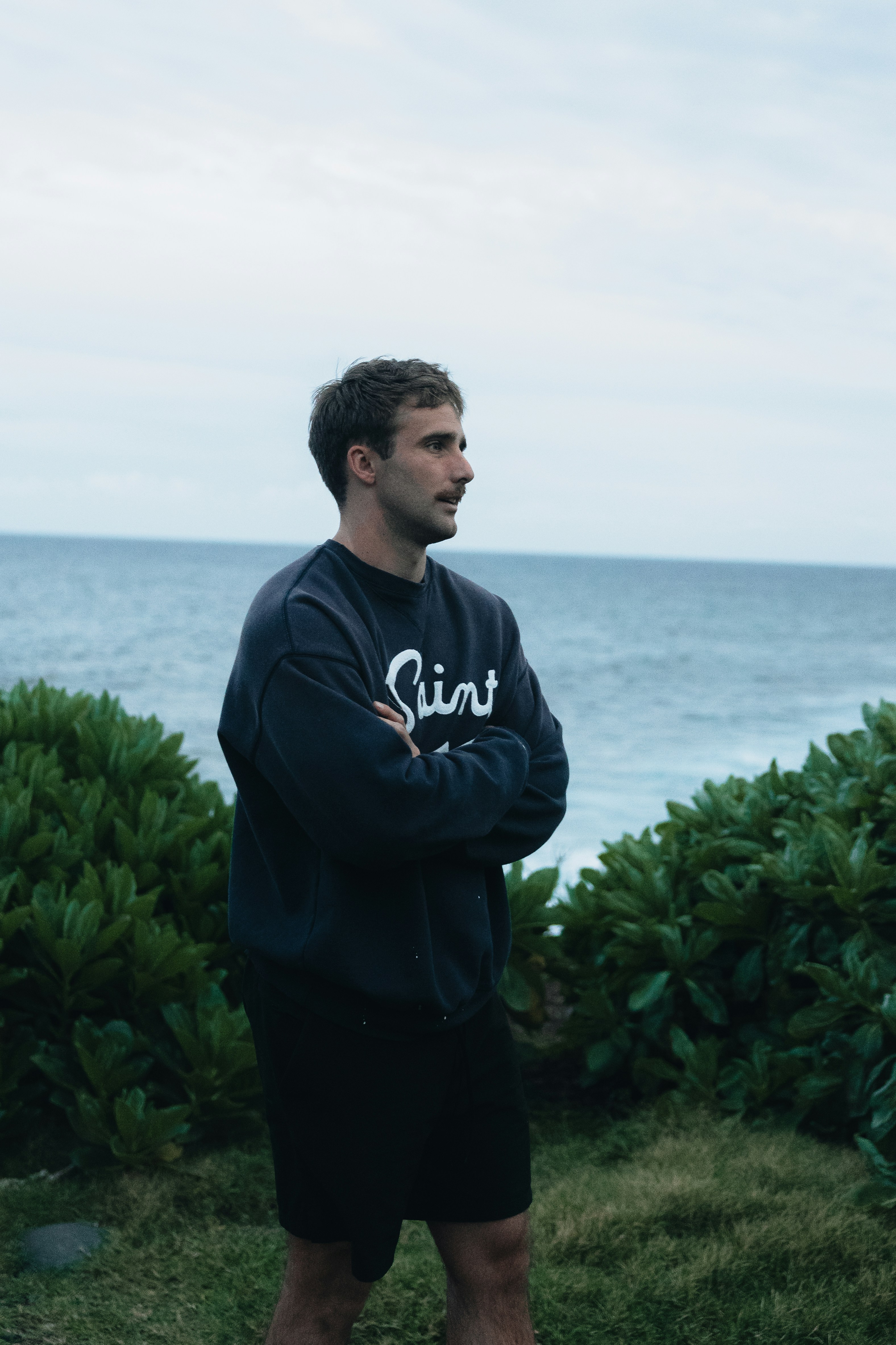 Coastal Contemplation: A Quiet Stance Against the Sea