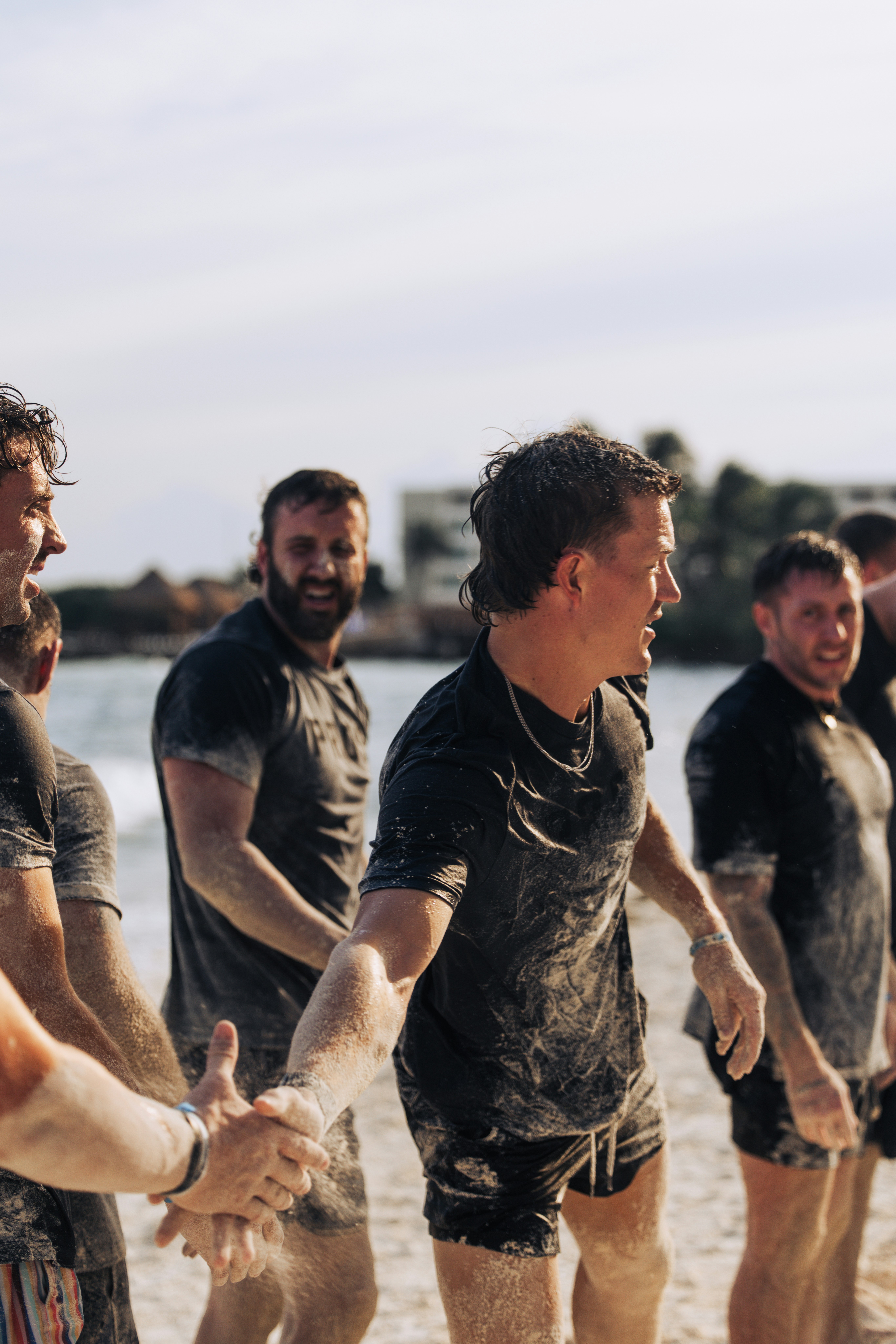 Handclasp on the Beach: Team Spirit Under the Sun