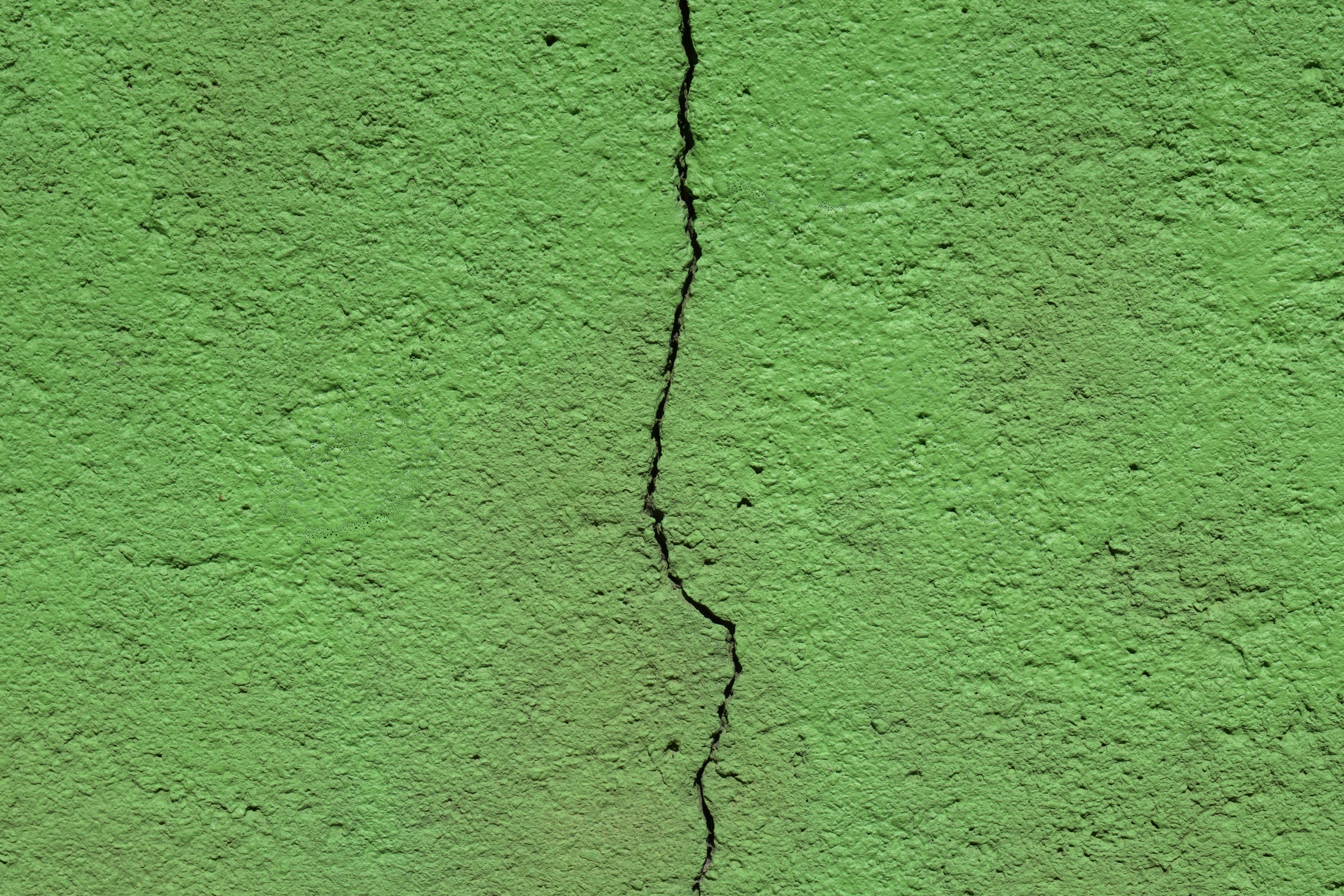 Crack Between Shades: A Green Wall Split