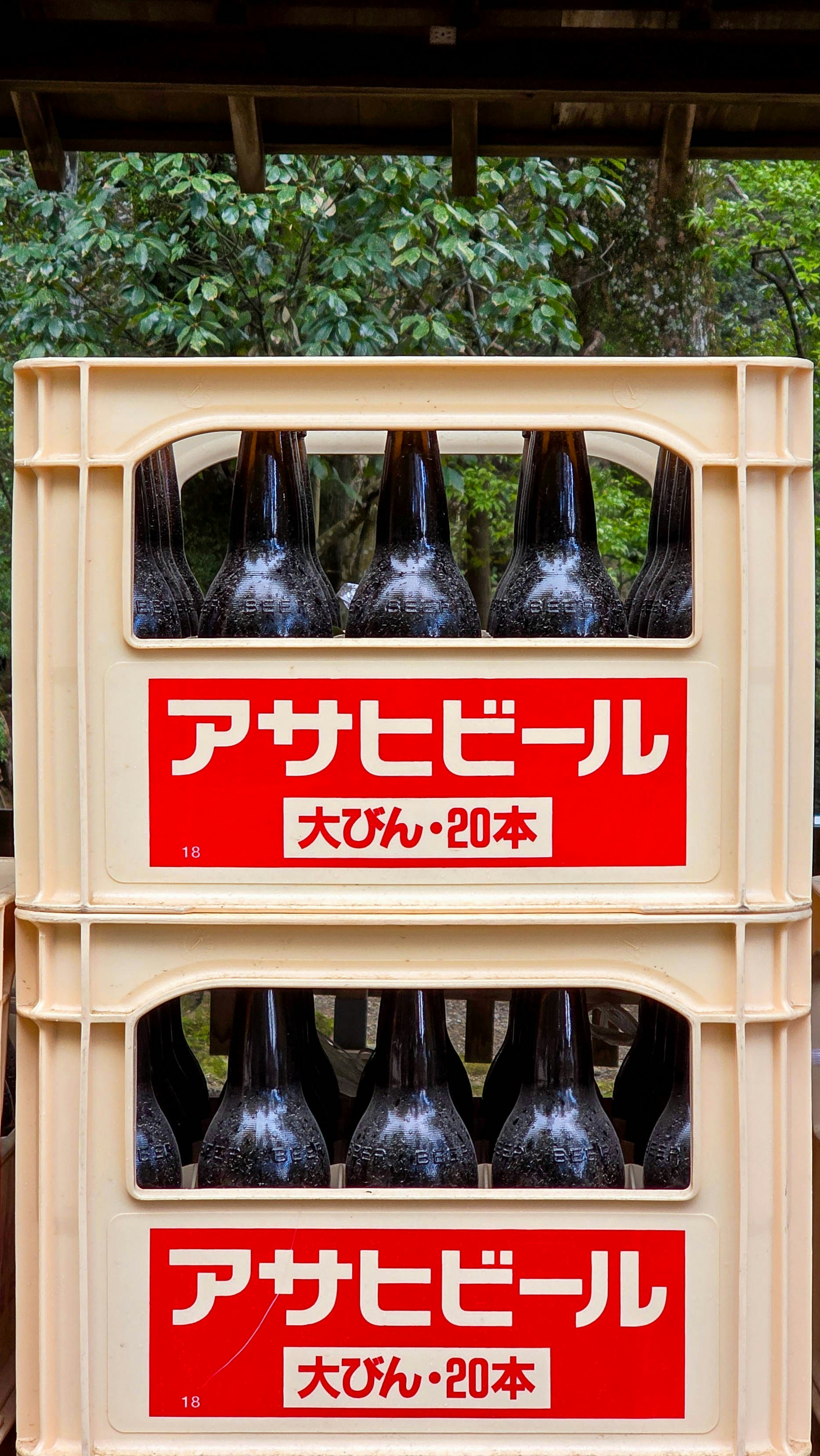 Crates of Japanese Beer: stacked bottles with bold red labels