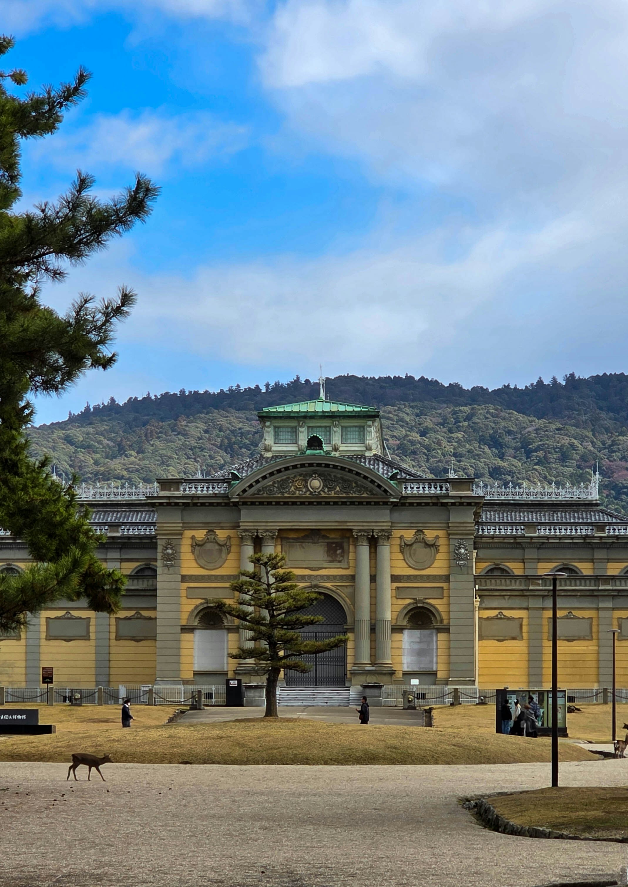 The Grand Pavilion of Quiet: A Historic Facade Amid Park and Hills