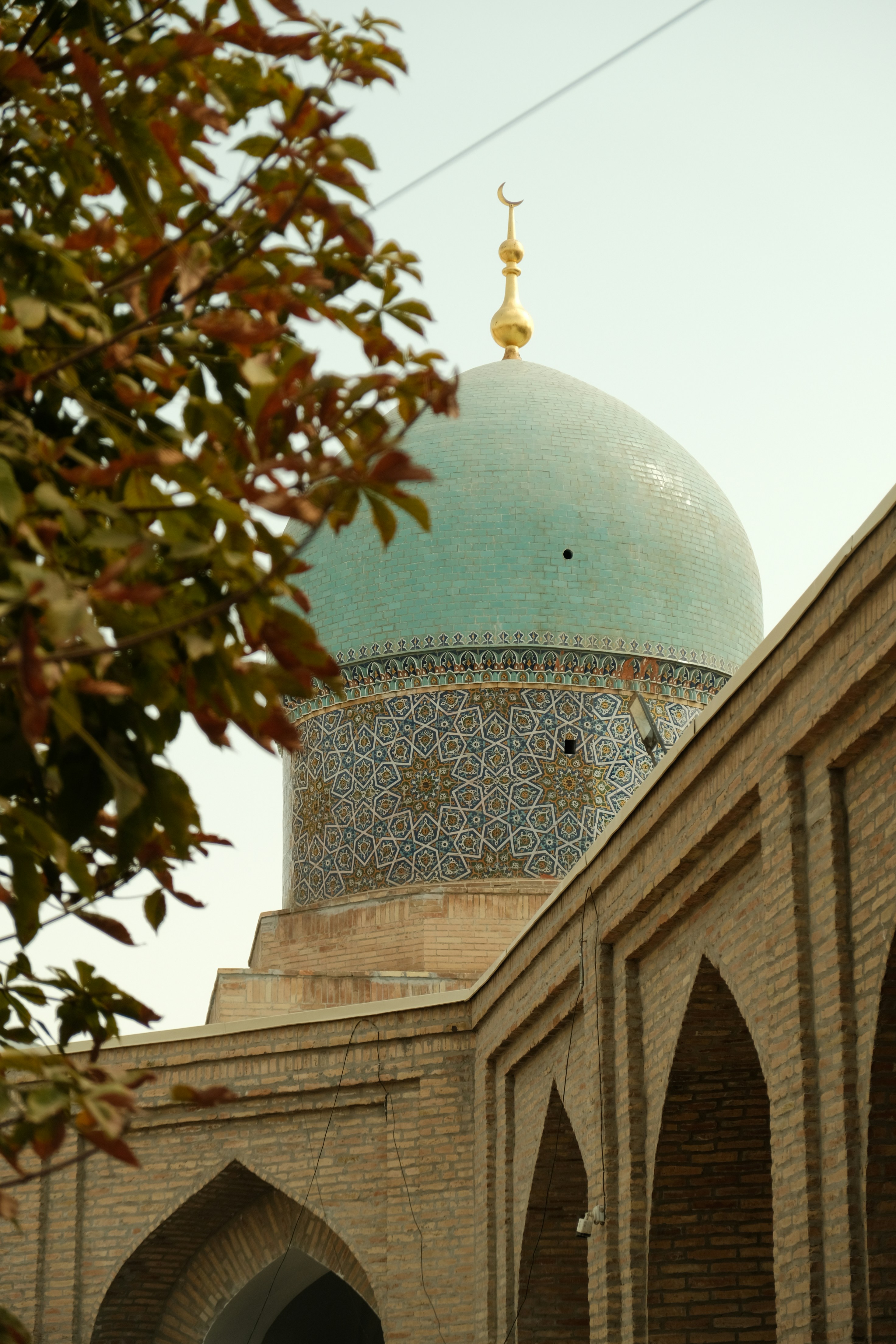 Turquoise Dome Over Brick Arches