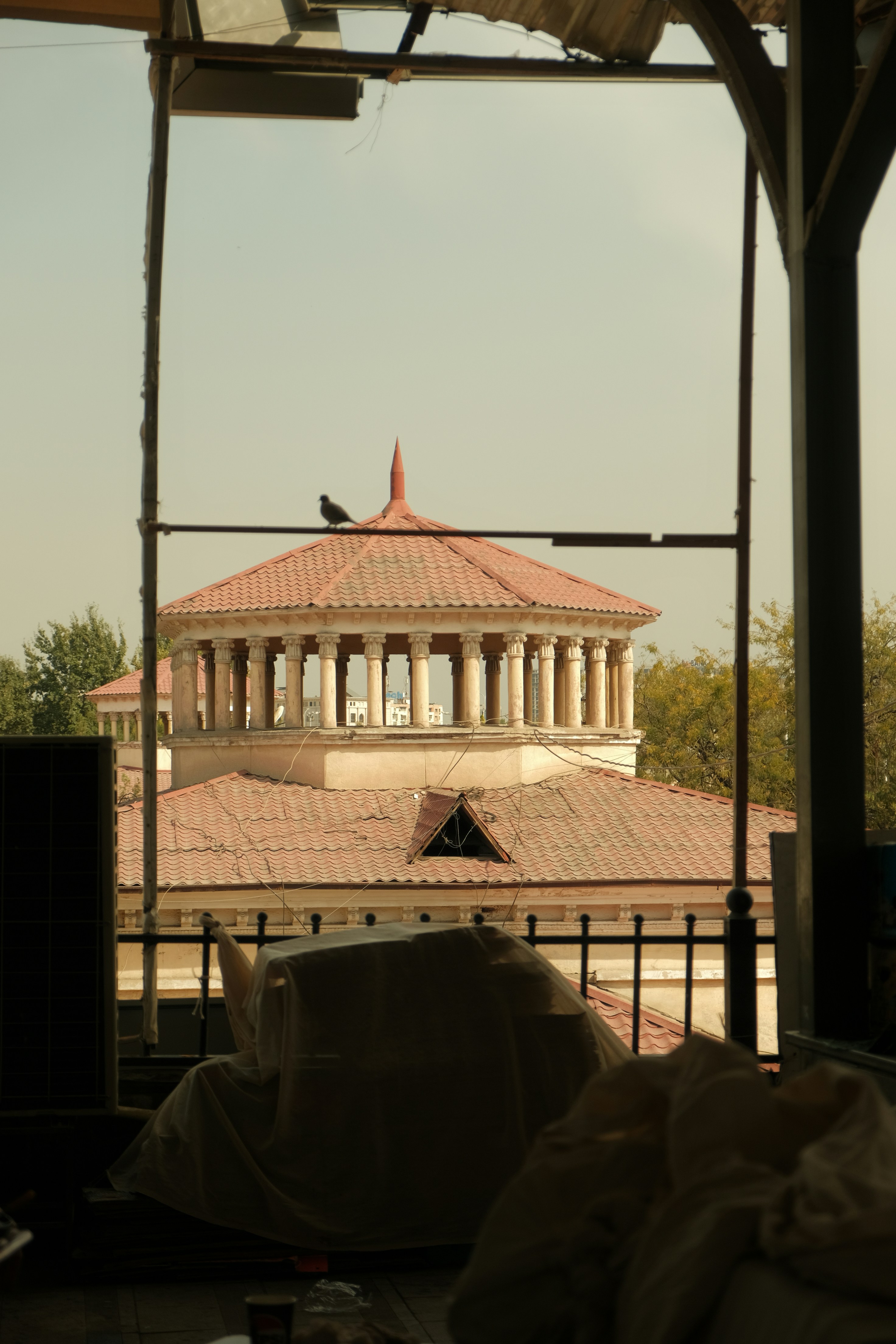 Balcony Vista: Classical Rotunda Silhouetted by Morning Light